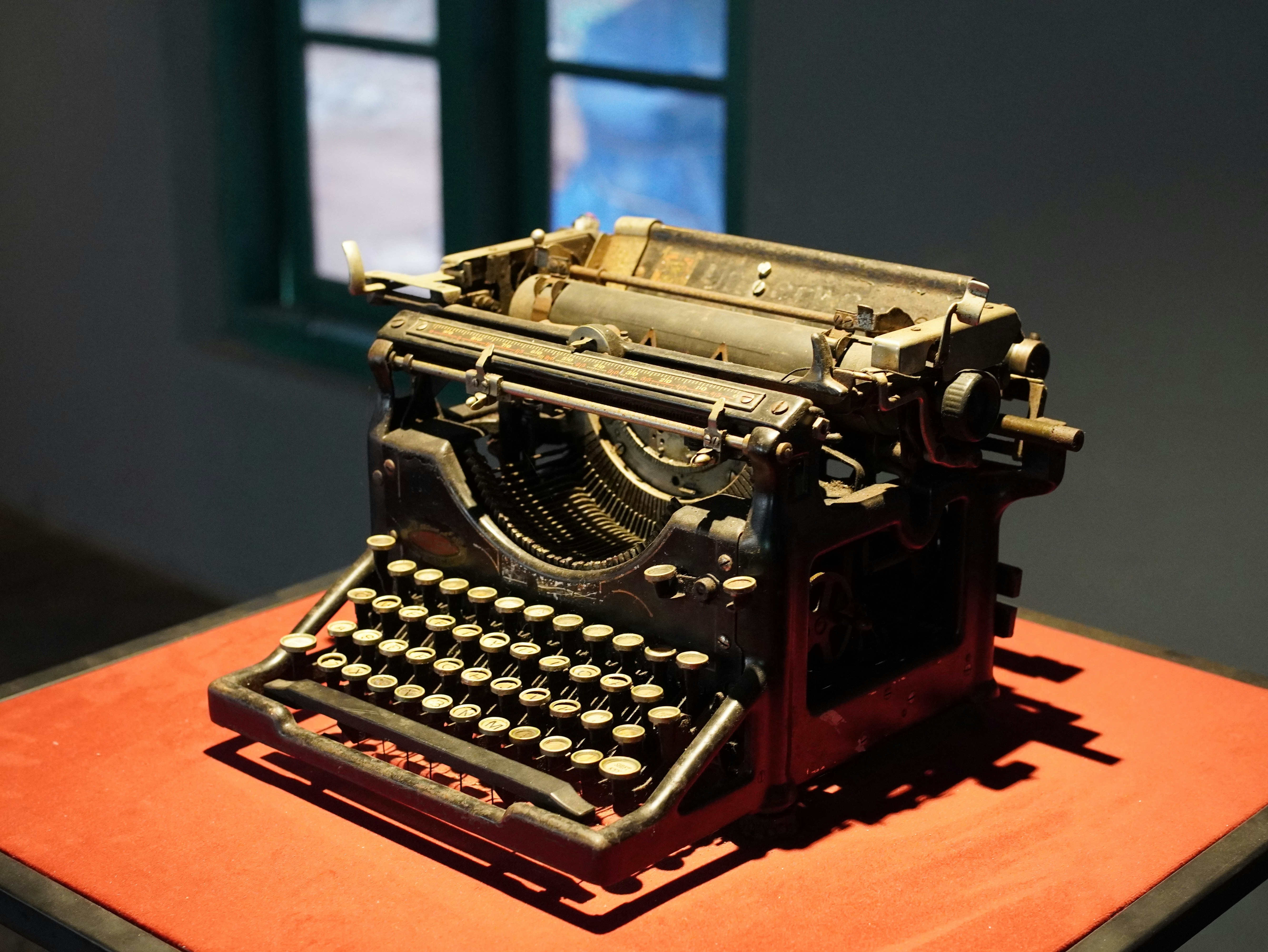 Dusty Ledger: An Antique Typewriter Under Soft Spotlight