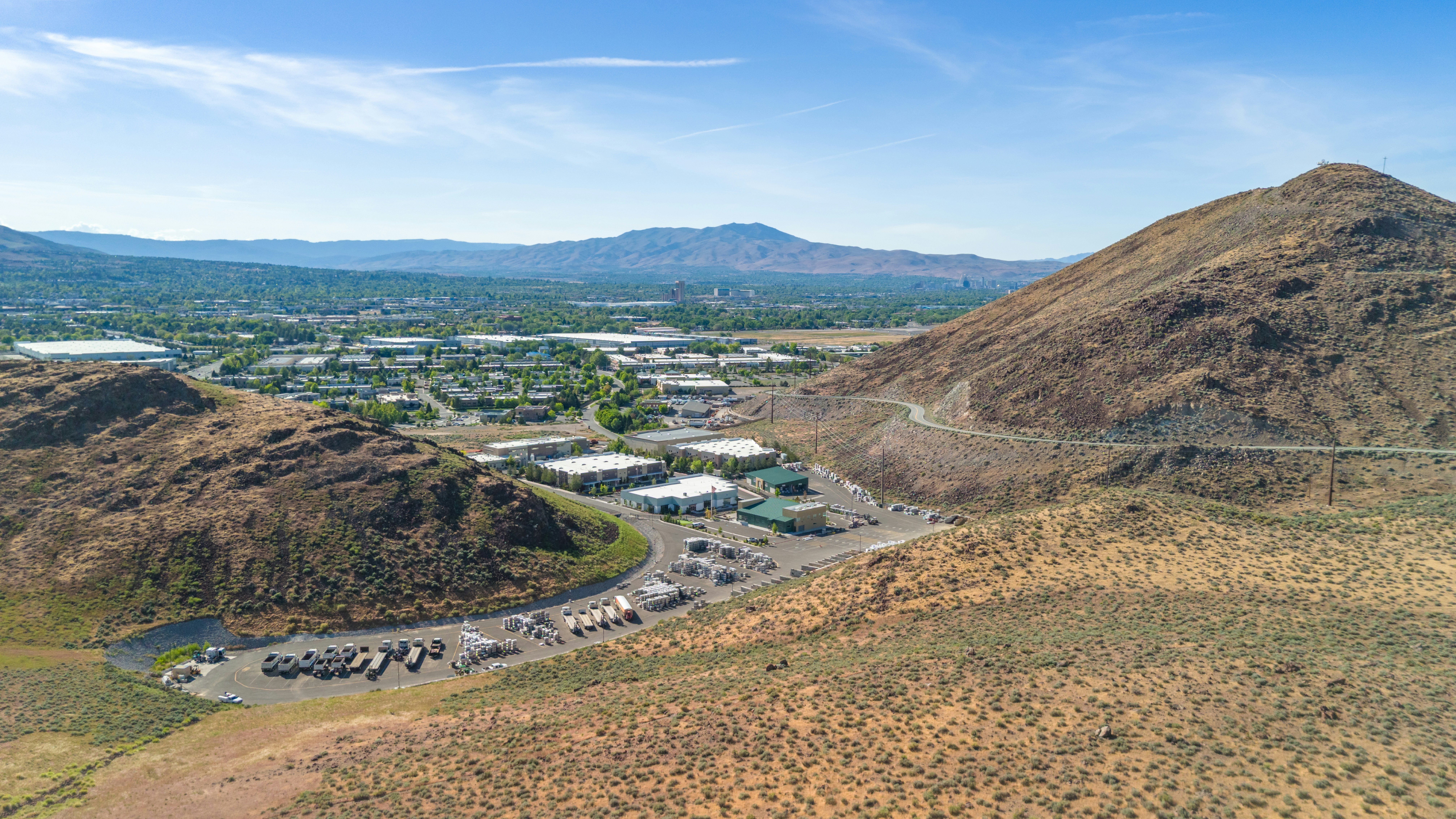 High Desert Vista: A River of Roadways Circling a Hill