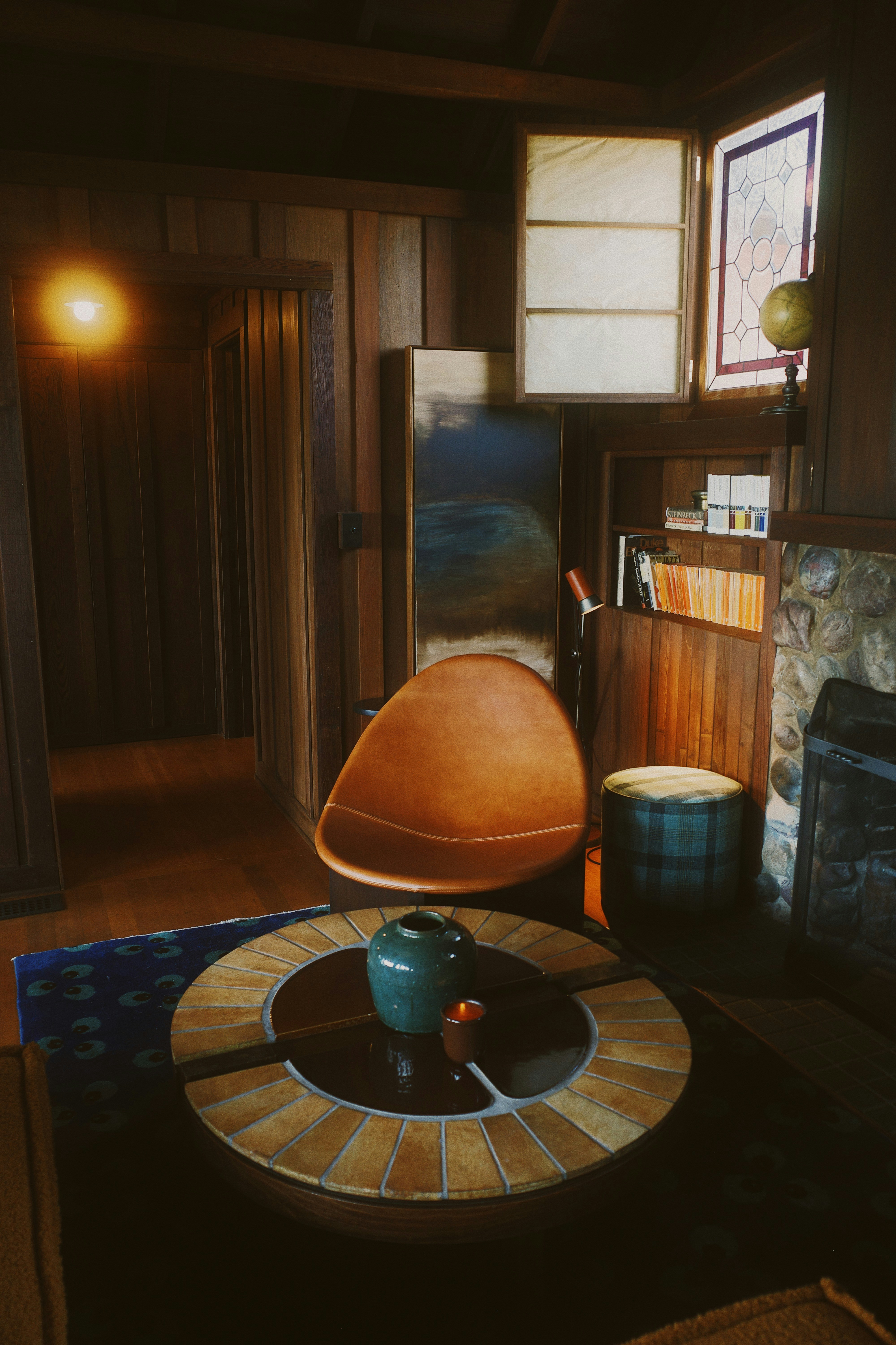 Mid-Century Hearthside Quiet: Warm Light in a Wood-Clad Lounge