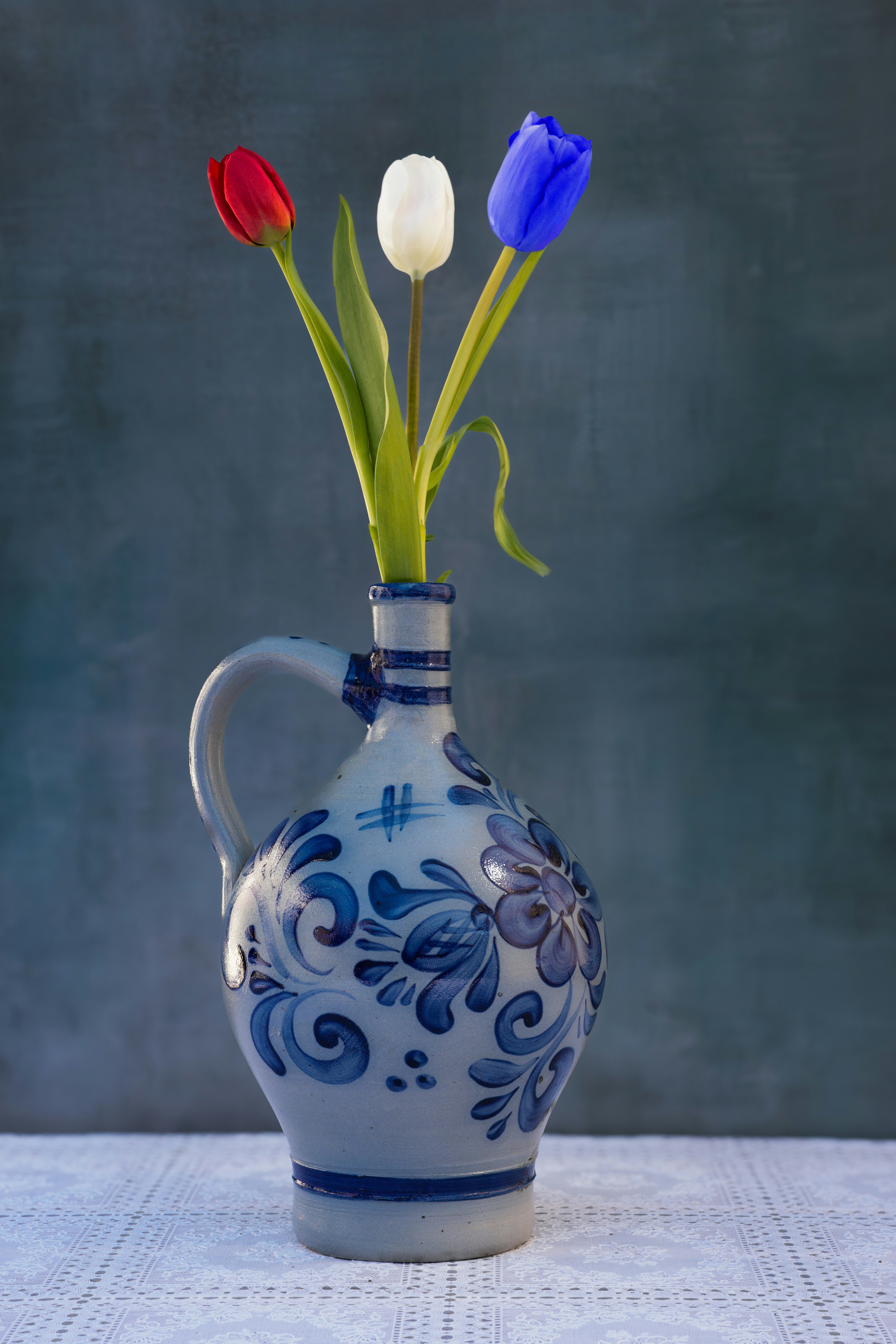Three Tulips in a Cerulean Vase Glow