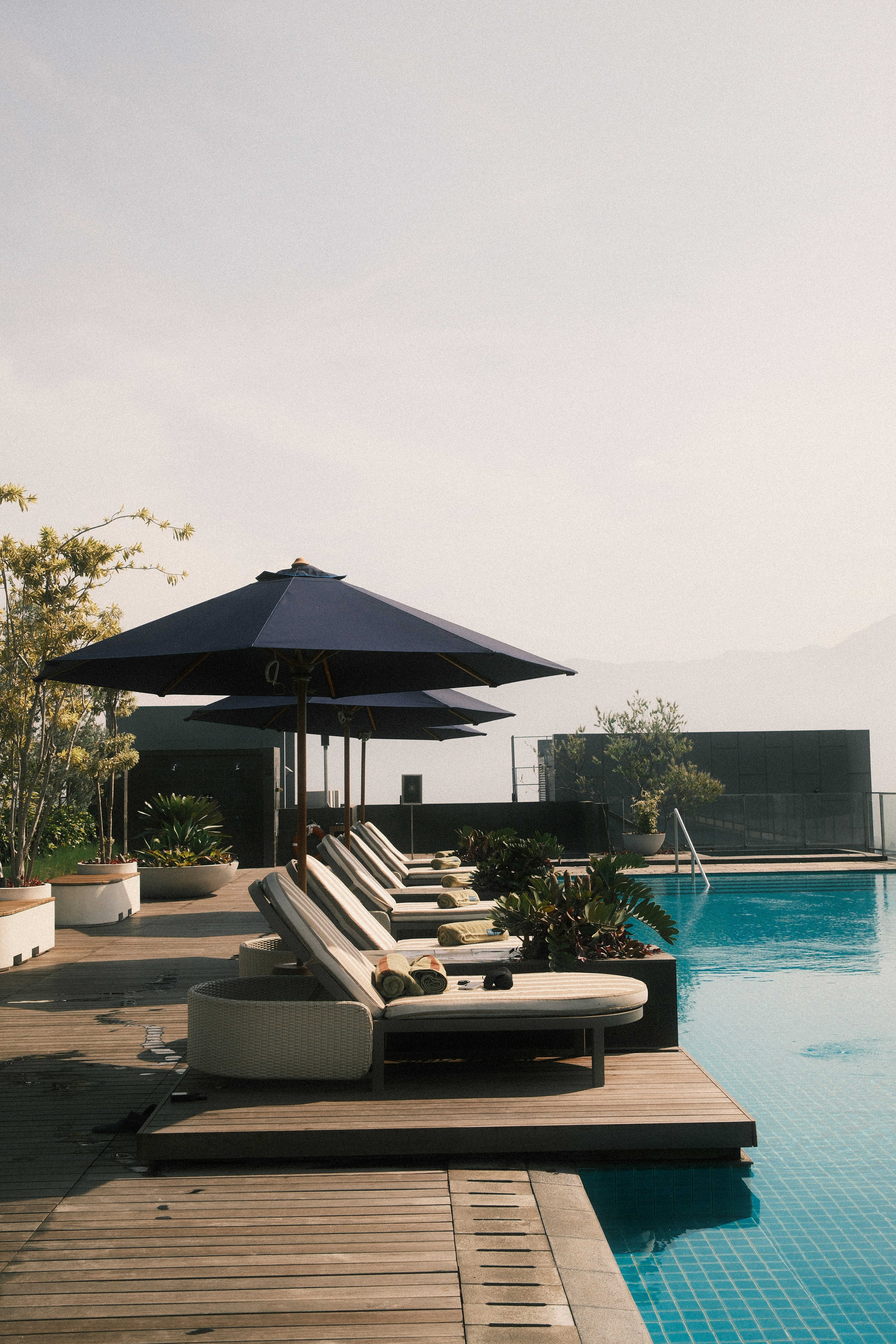 Row of Poolside Loungers under Shade, at Sunset Terrace