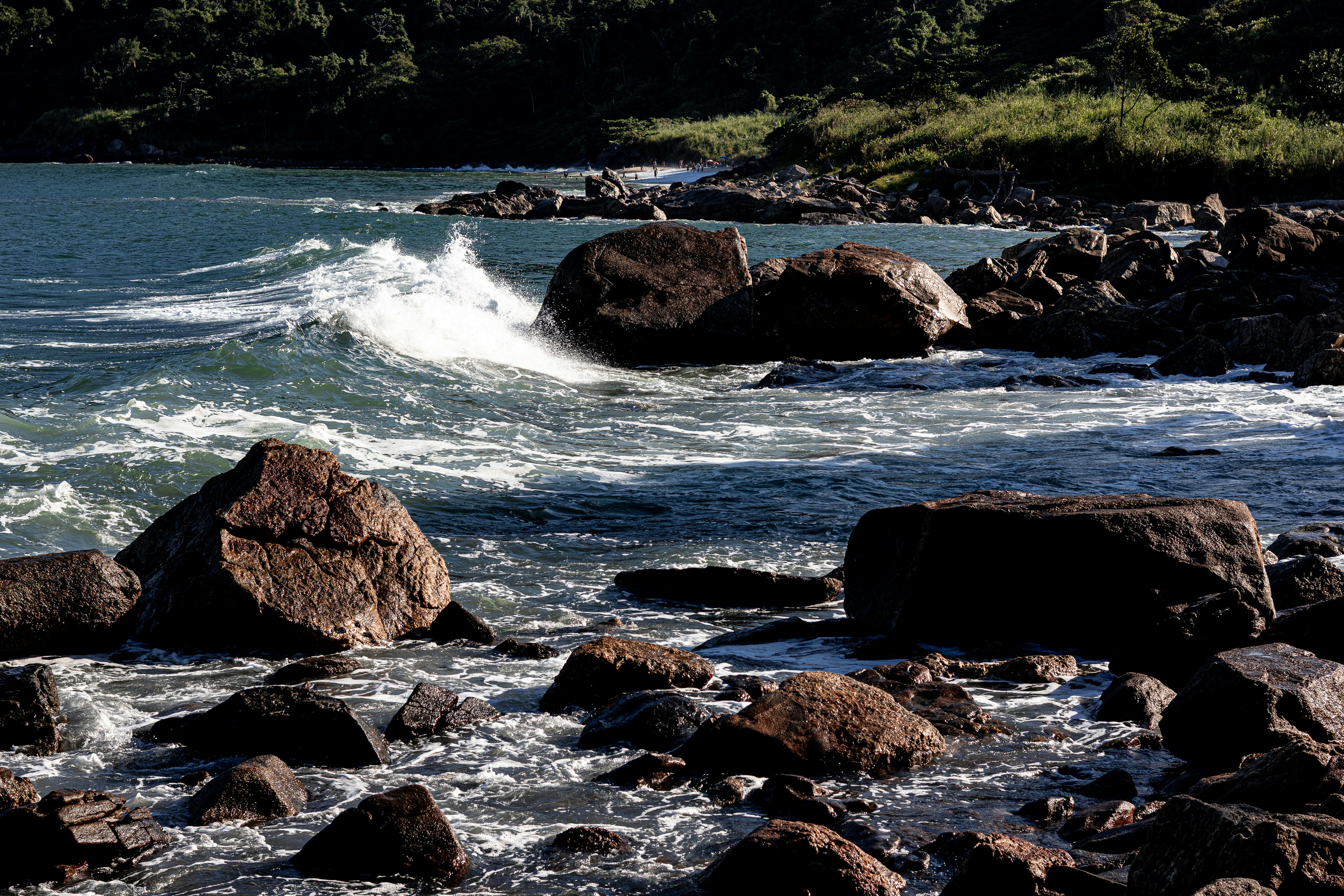 Storm-Washed Rocks Beside a Quiet Shoreline