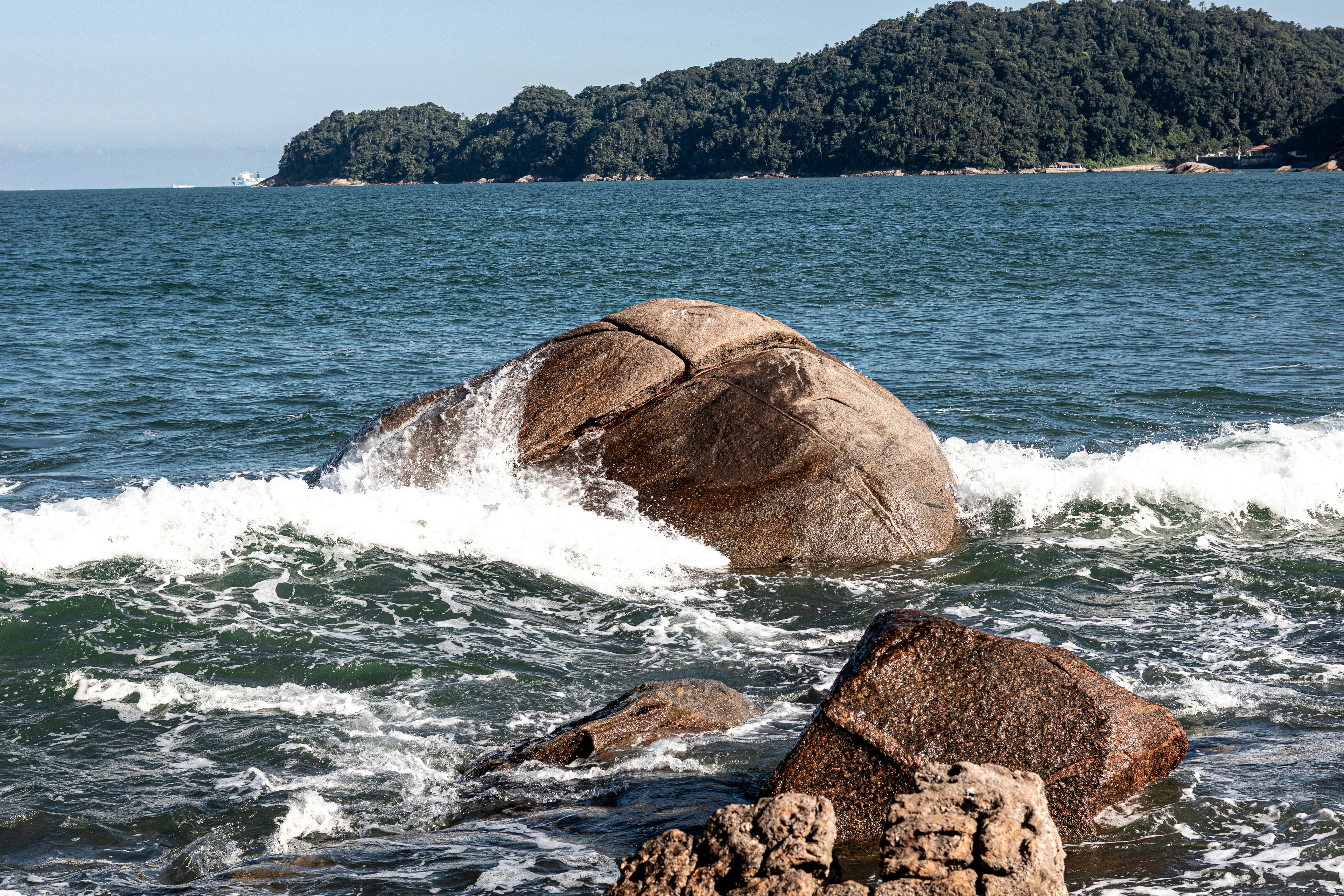 Sea-stone Sentinel: A Lone Boulder Guarding the Breakers
