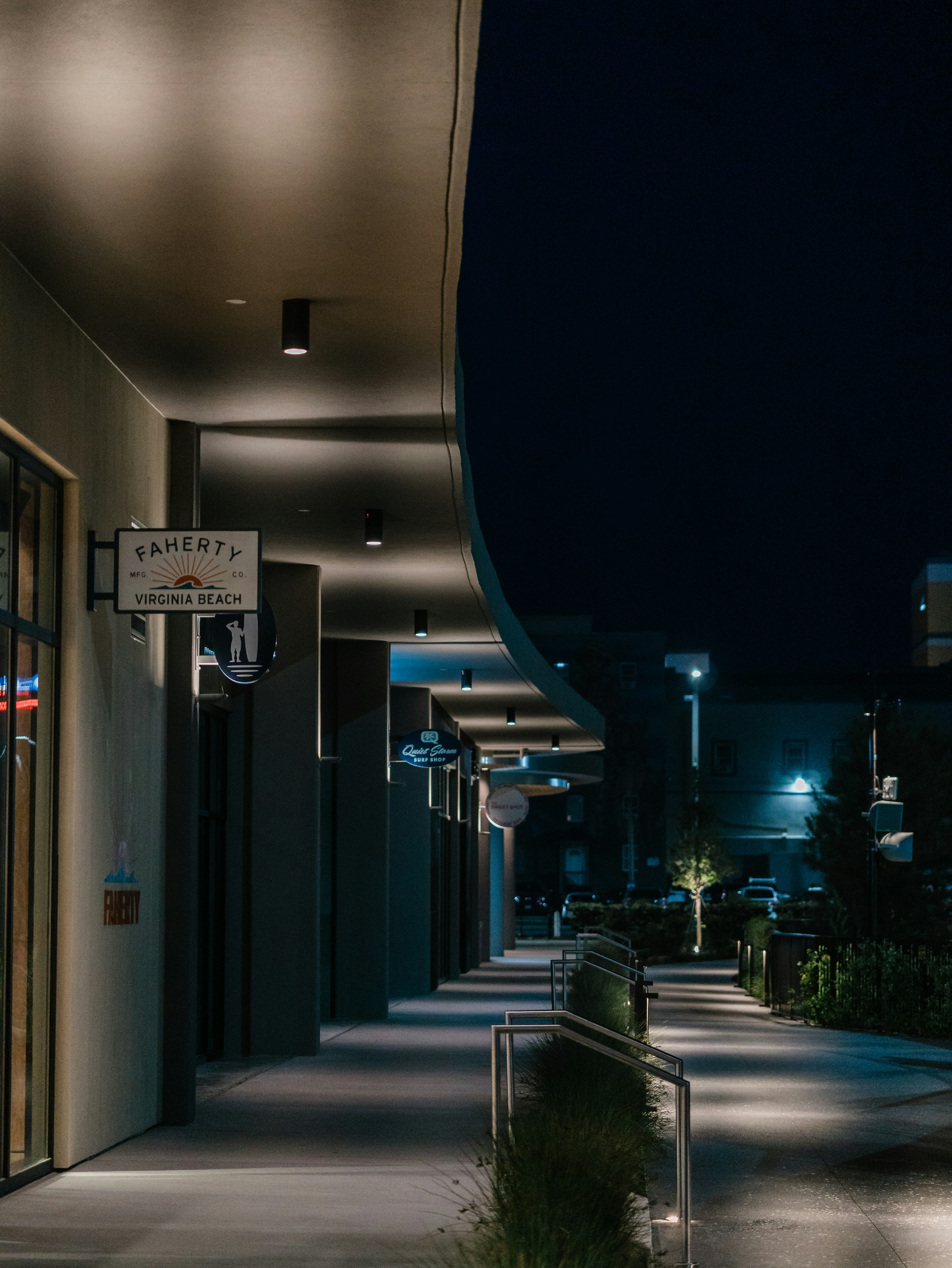 Night Walkway: Neon Glow Along a Quiet Shopping Arcade