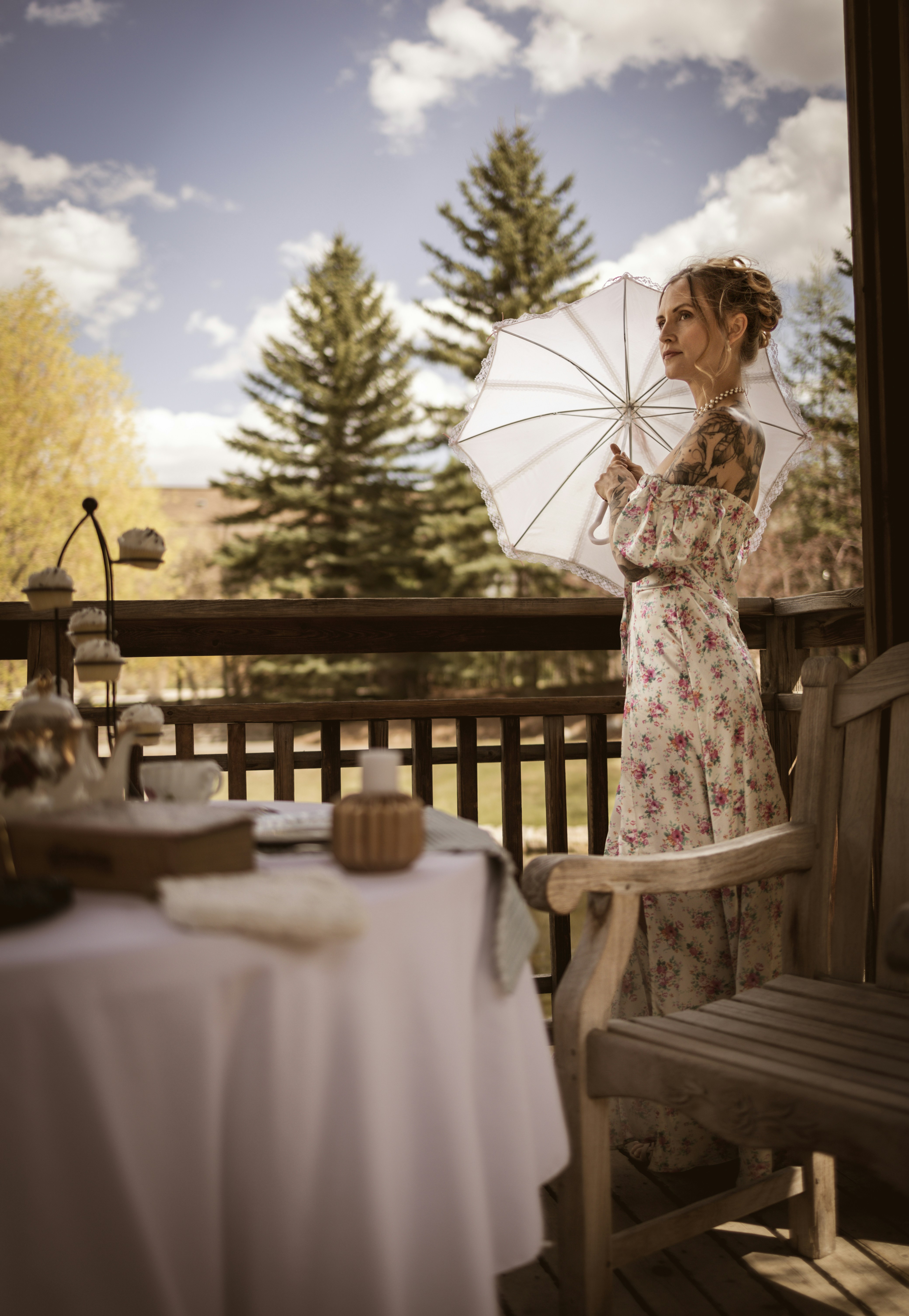 Tea on the Veranda: A Quiet Moment with Lace and Umbrella