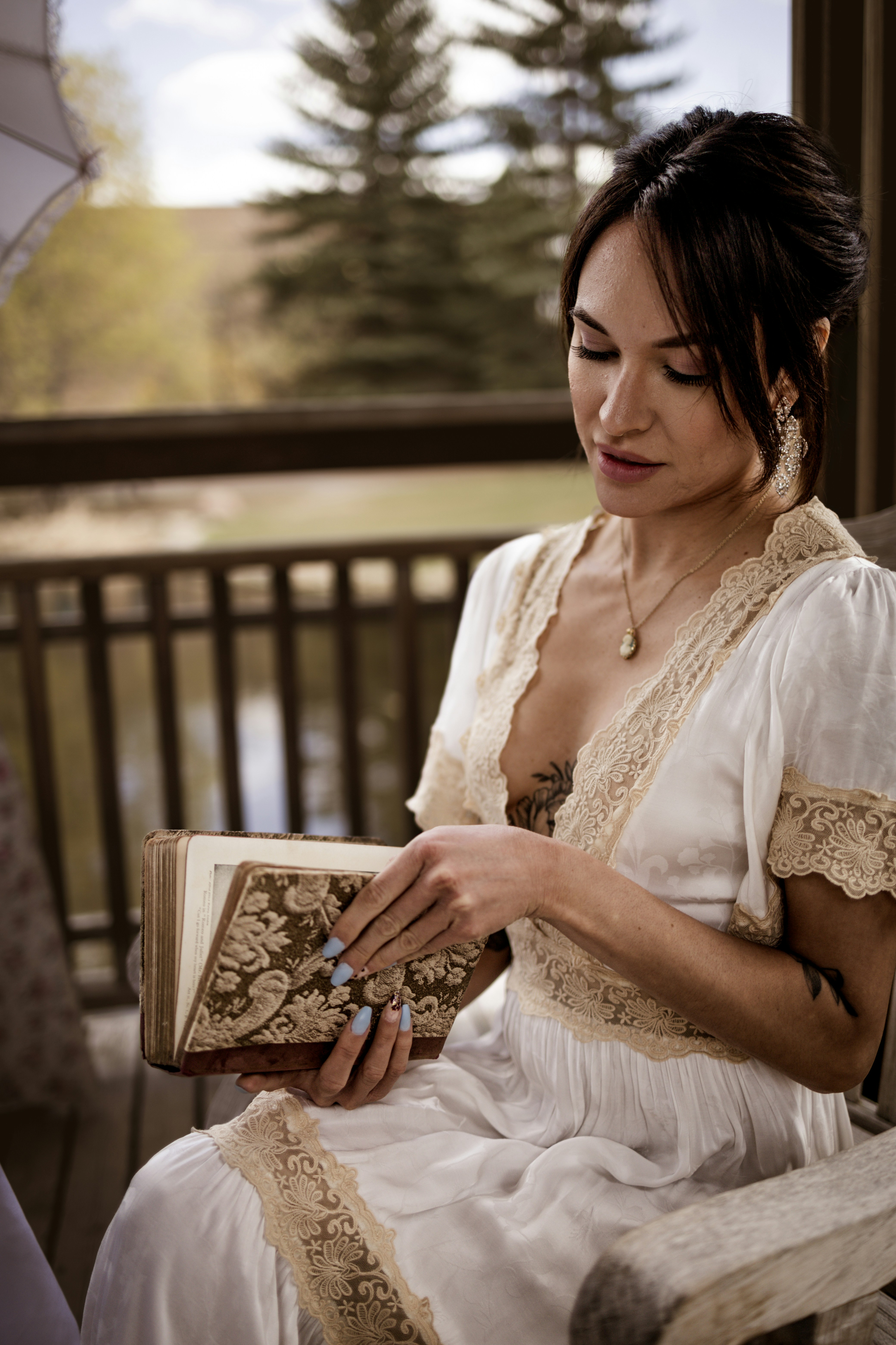 Reading by Windowlight: Lace, Lipstick, and Quiet Reflection
