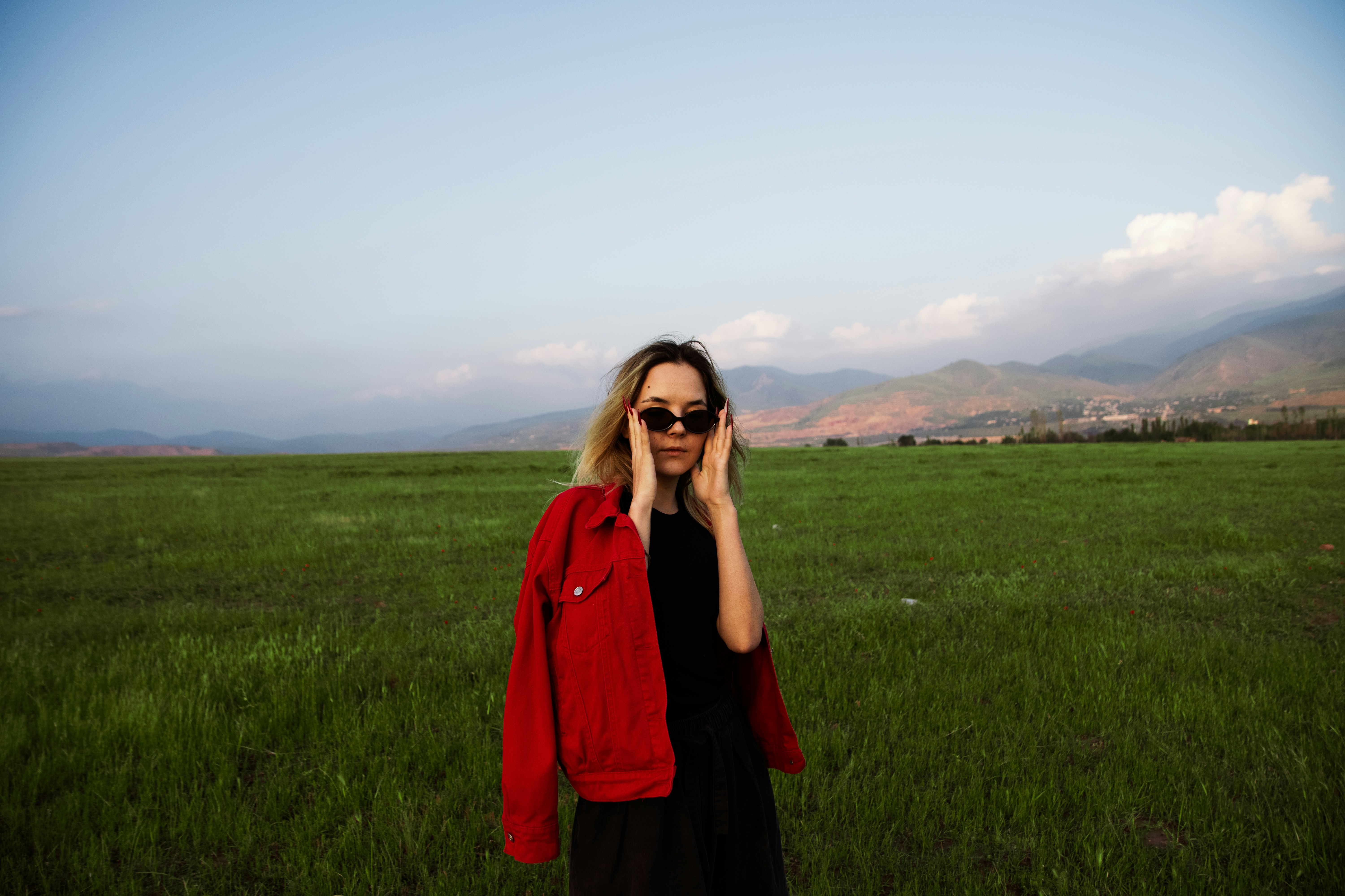 A Bold Red Moment in a Wide-Open Field