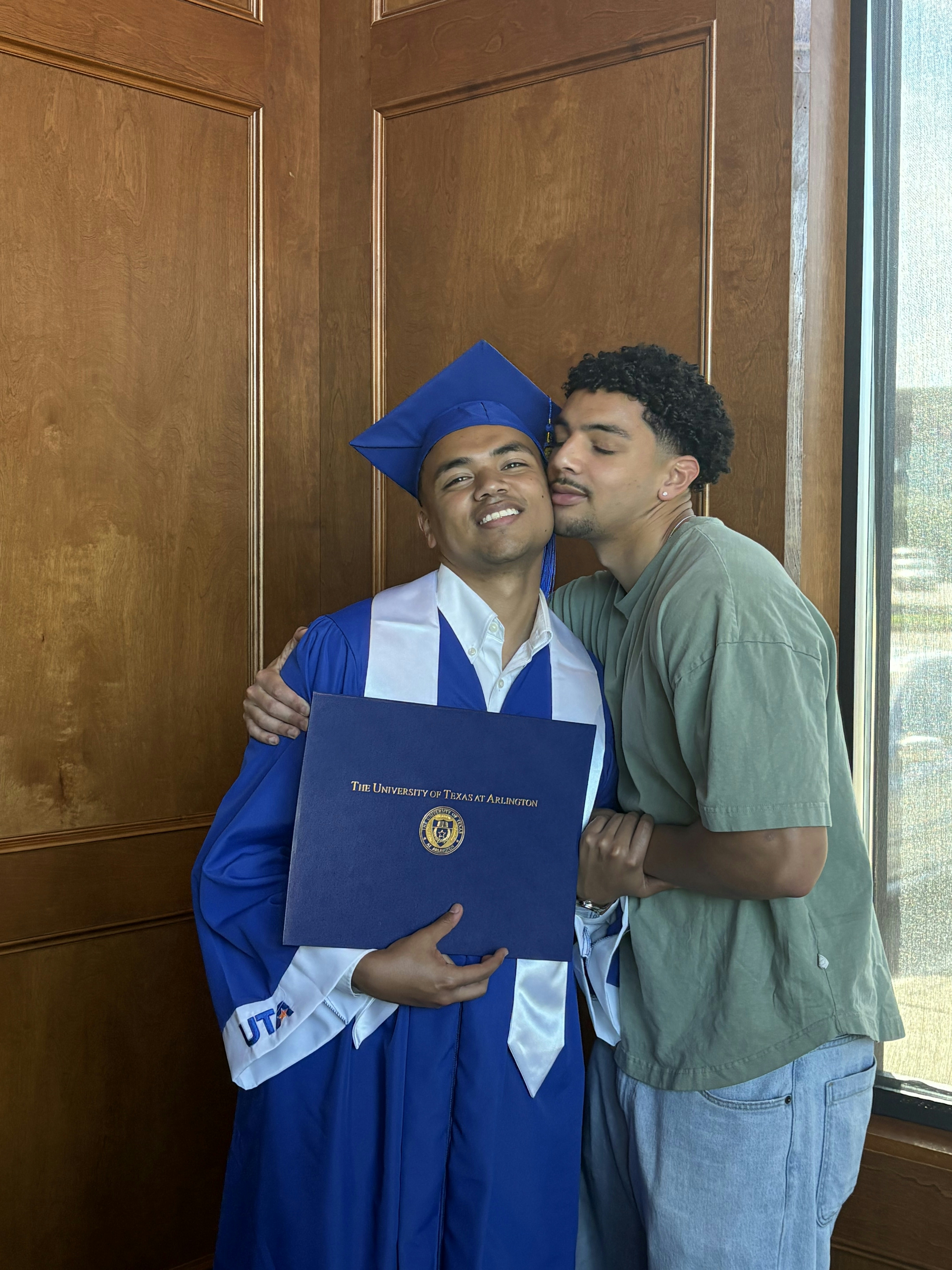 Graduation Hug: A Moment of Shared Joy