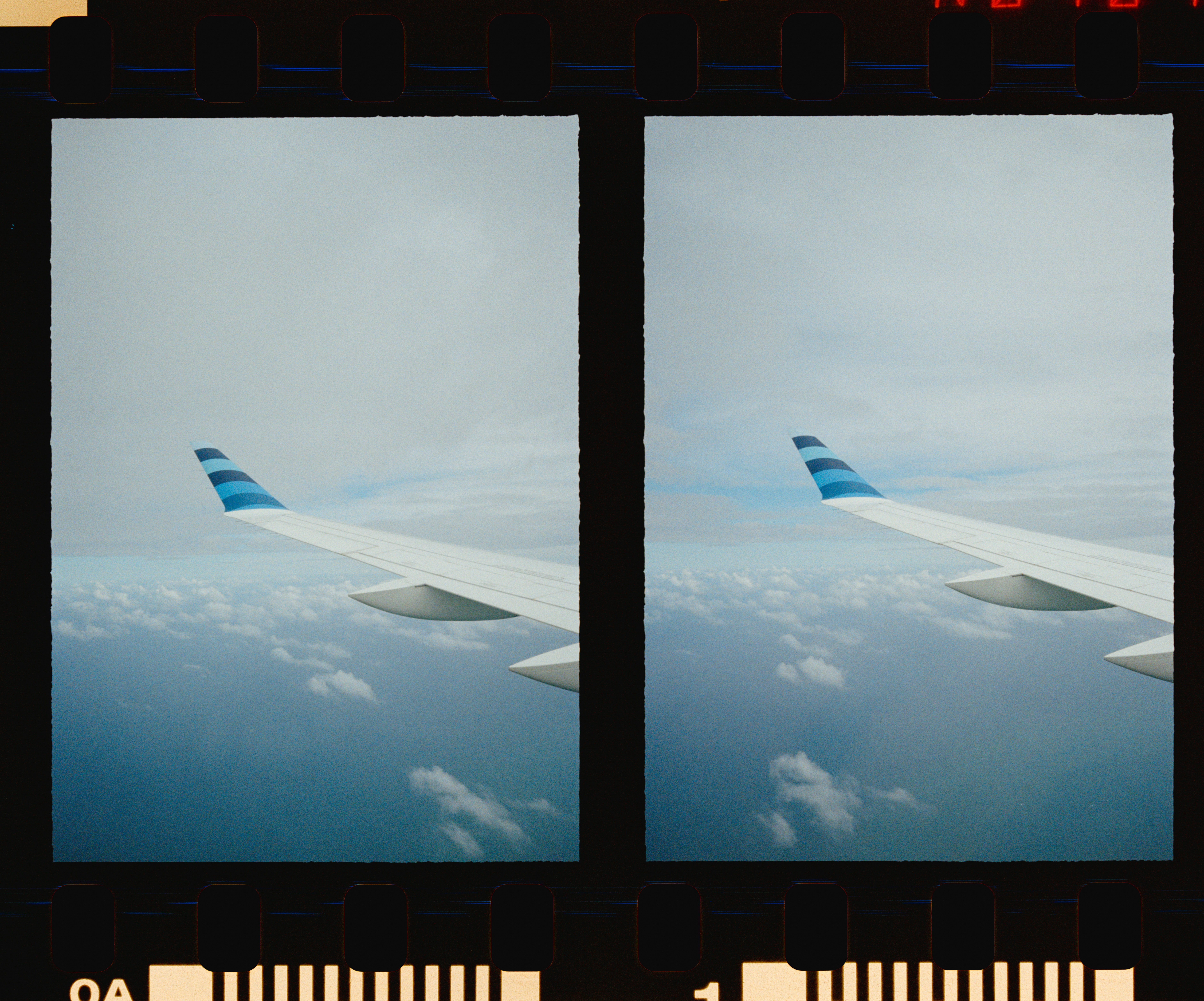 Wingtip Ascent: Skyward Lines from a Flight Window