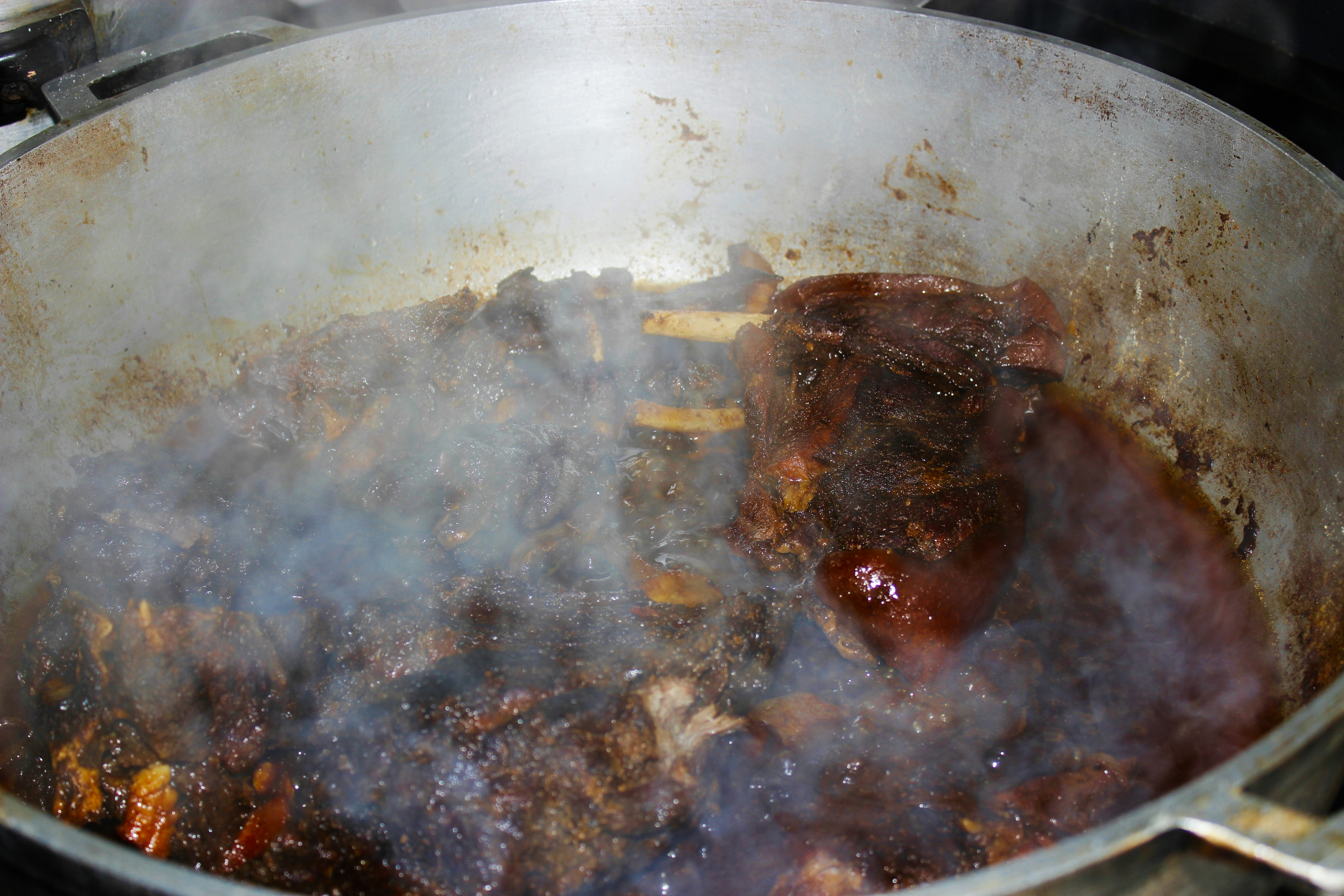 Heavy Pot of Braised Meat Rising in Steam