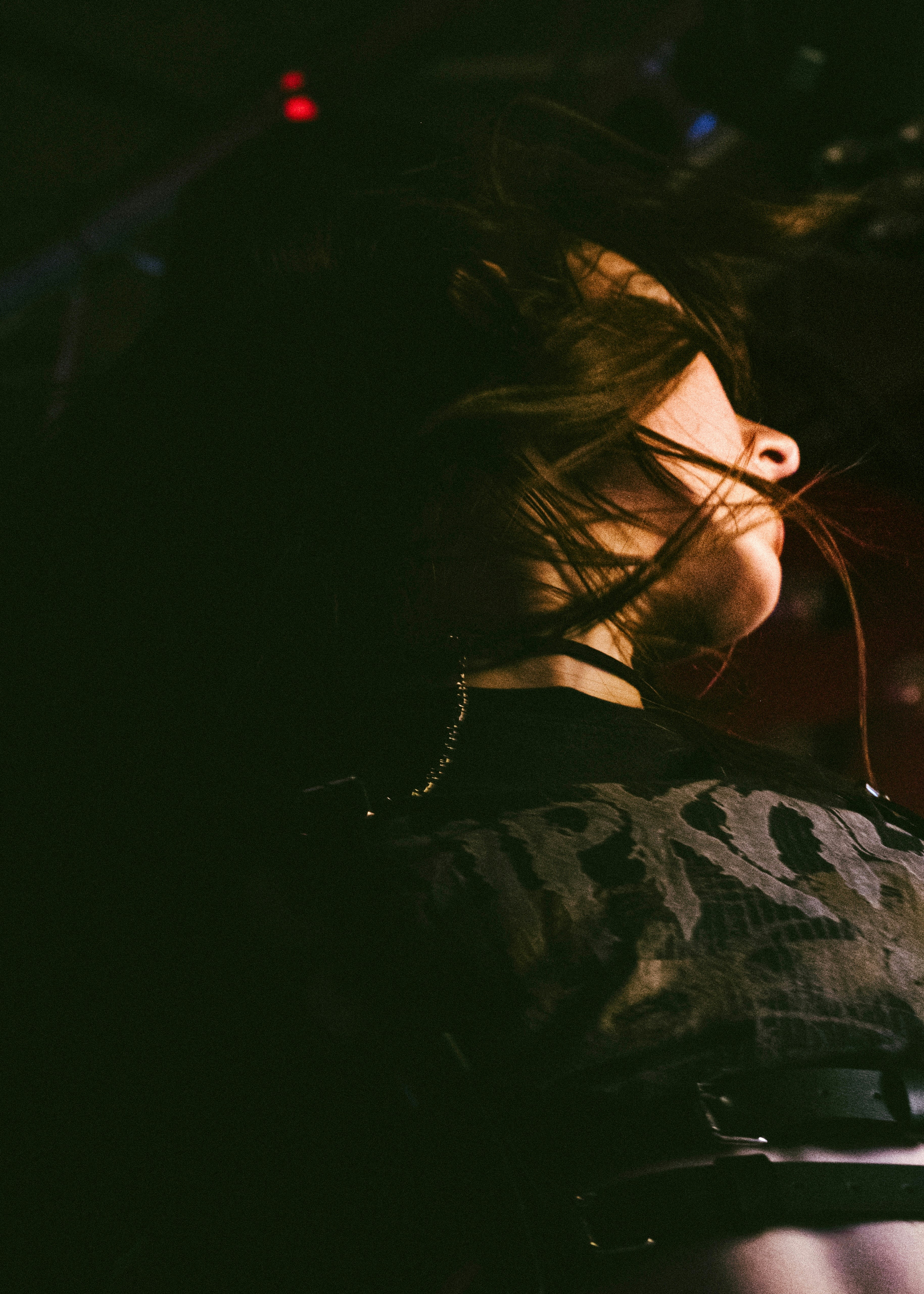 Shadows and Silhouette: A Nighttime Portrait in Motion
