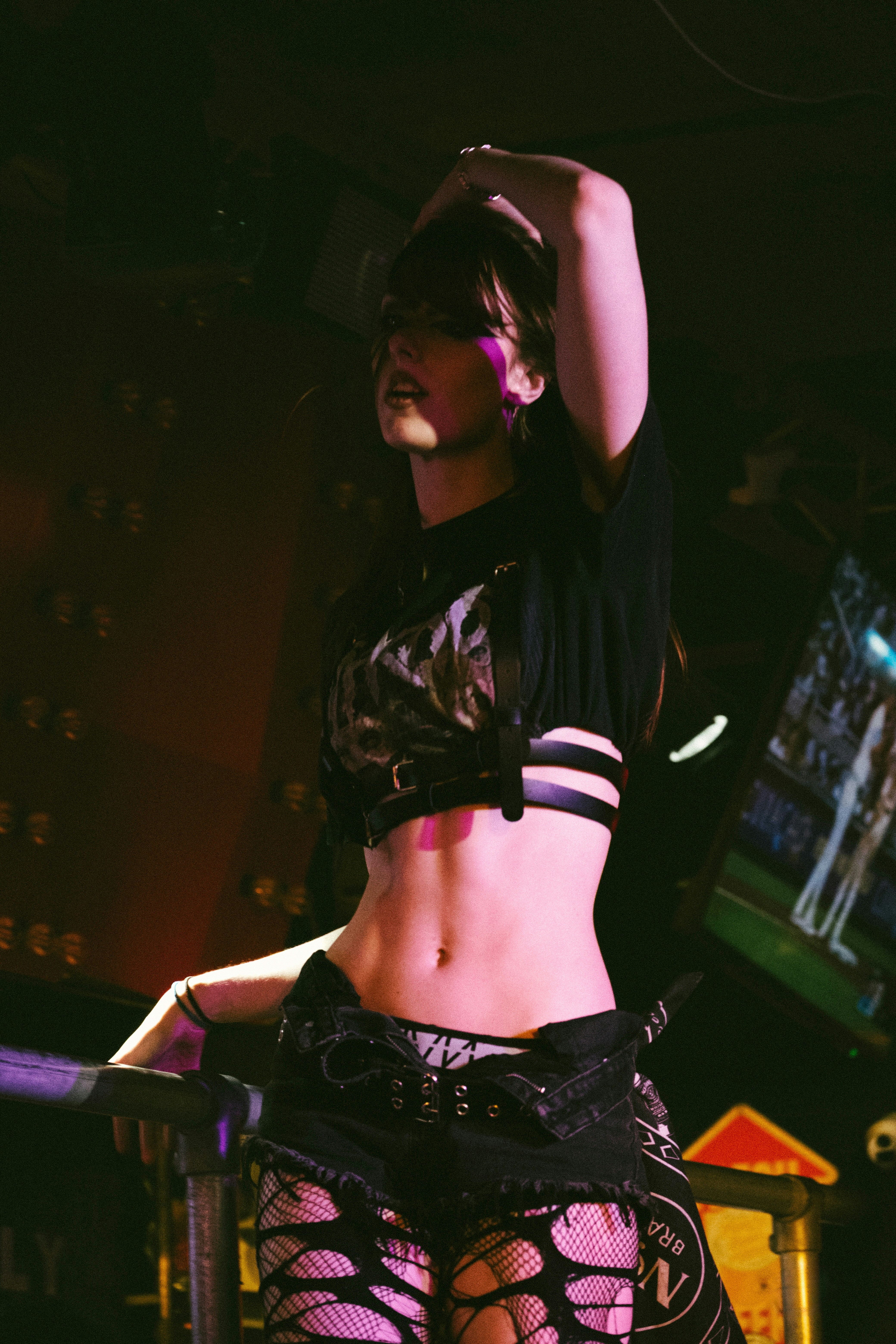 Midriff Pulse: Clublight Silhouette in Motion