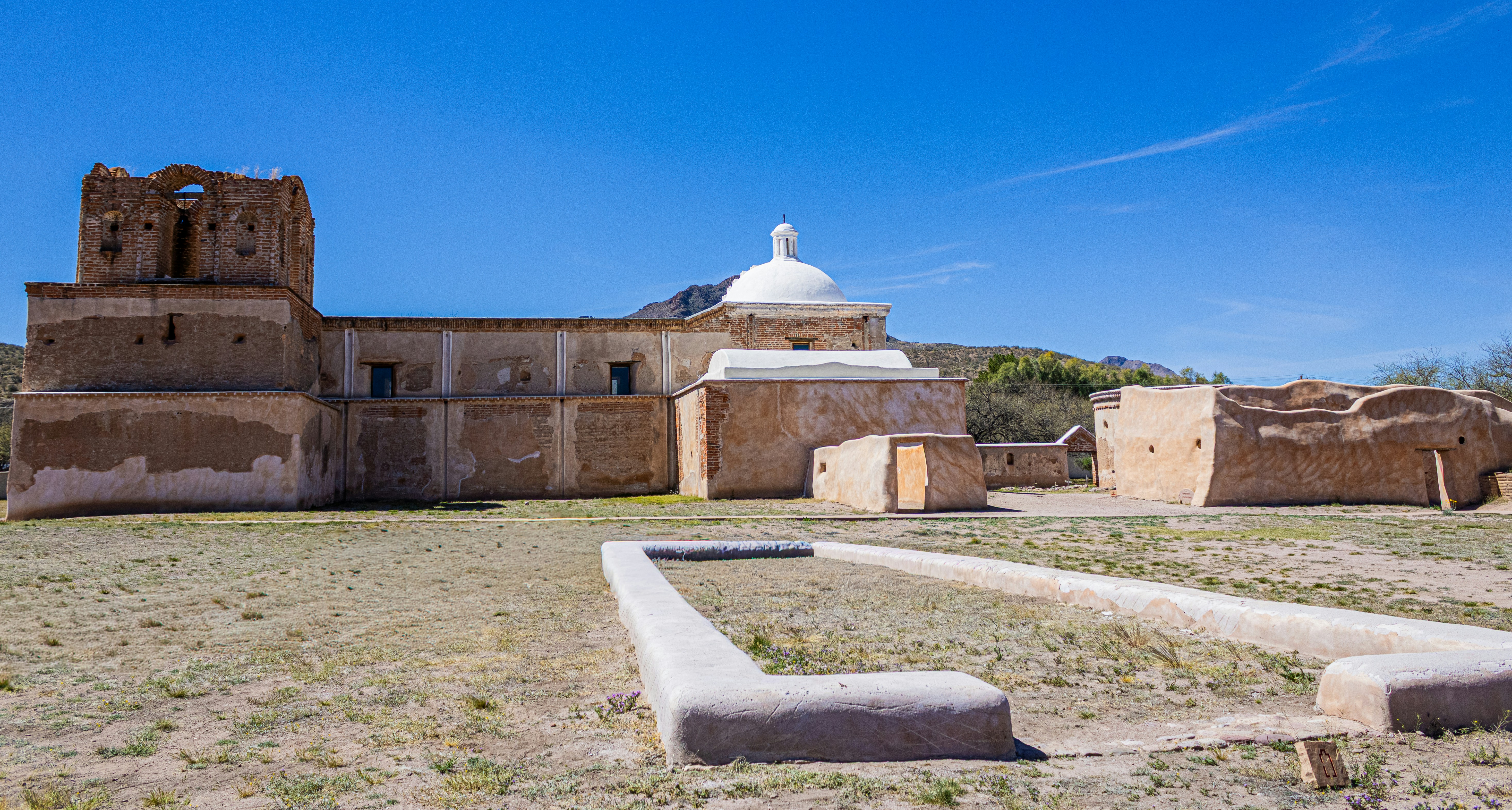 Ruins of a Sunlit Fortress: A Sharp Blue Sky Over a Deserted Complex