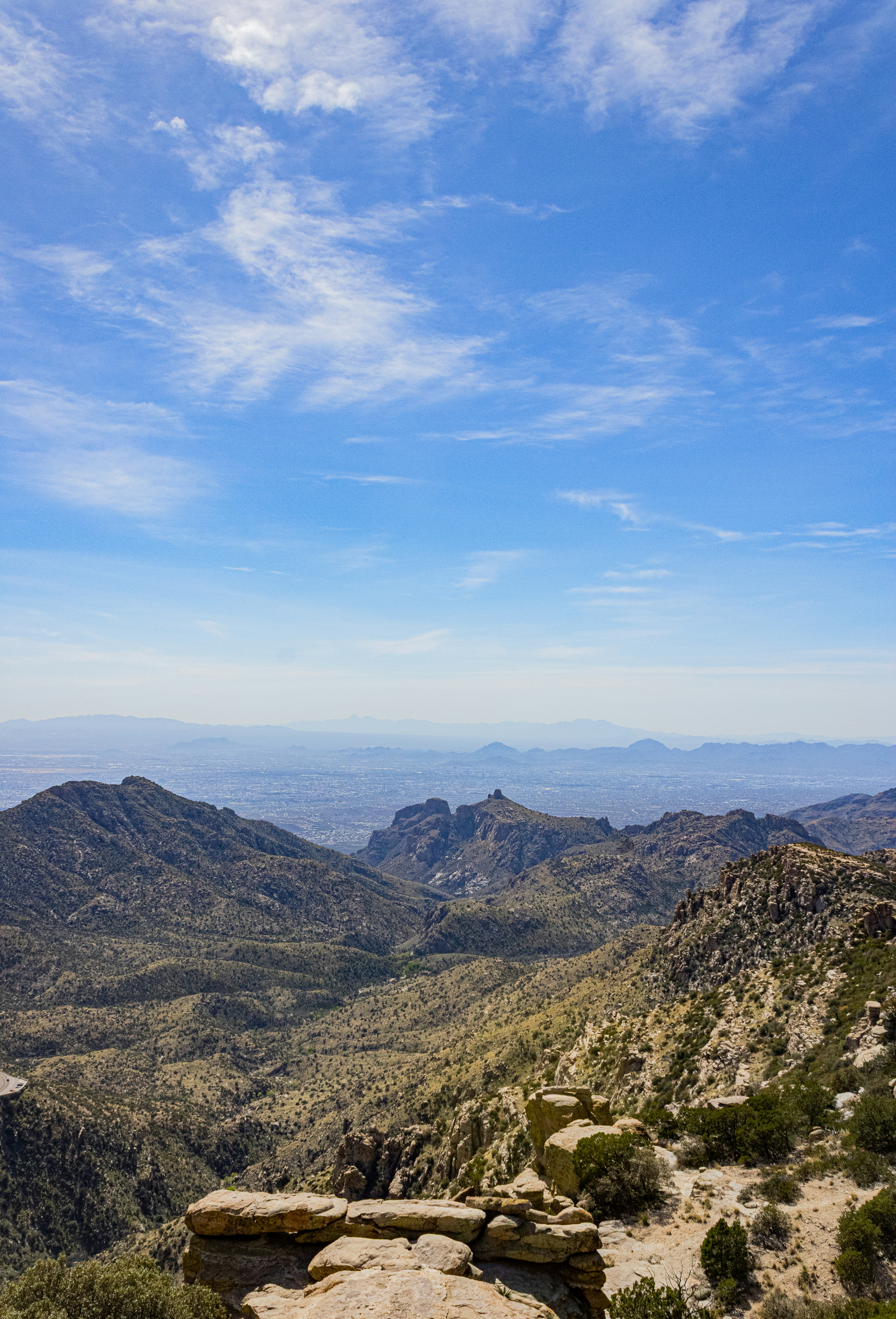 Ridge-top Horizon: Carved valleys under a crisp desert sky