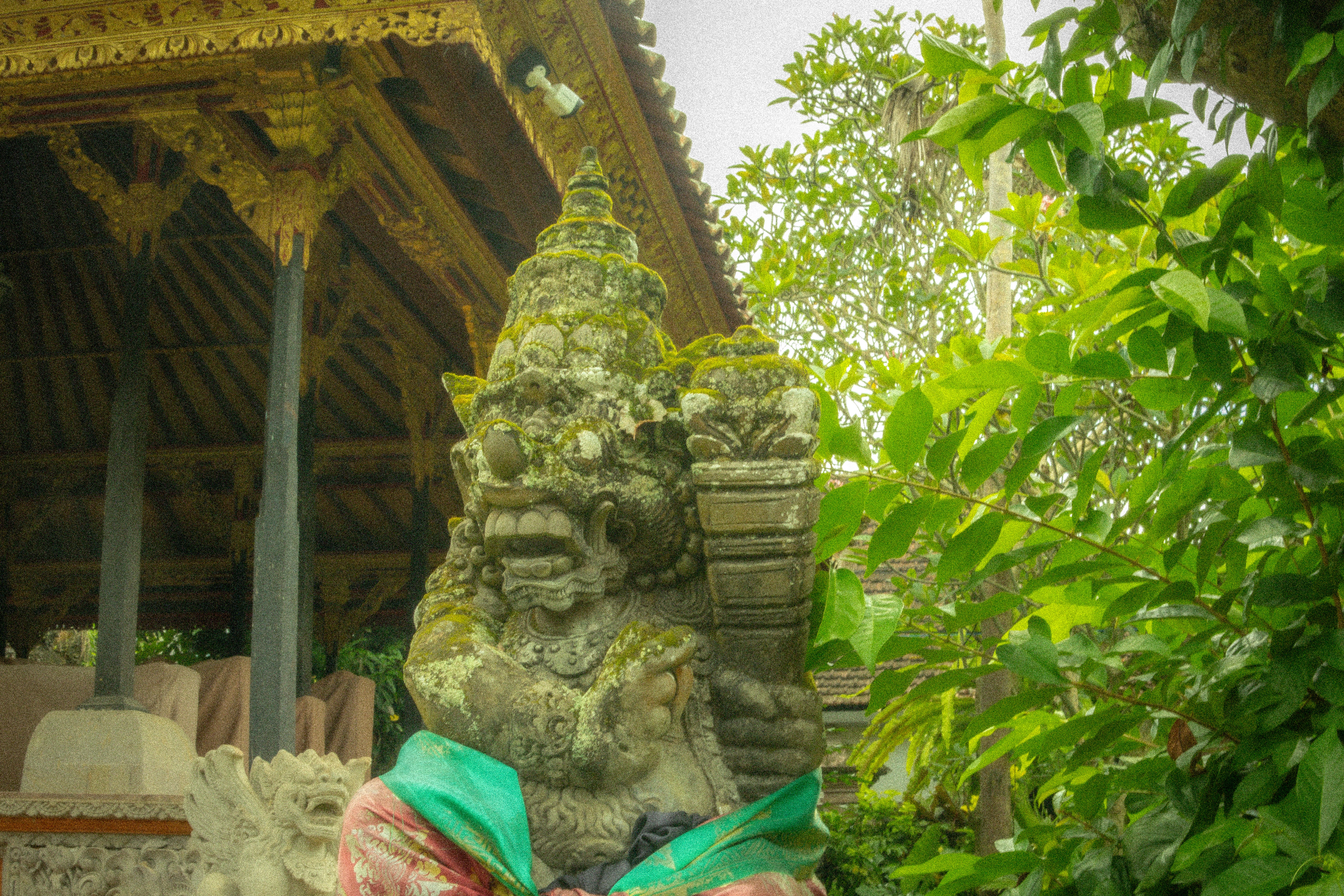 Stone Guardian under a Green Umbra