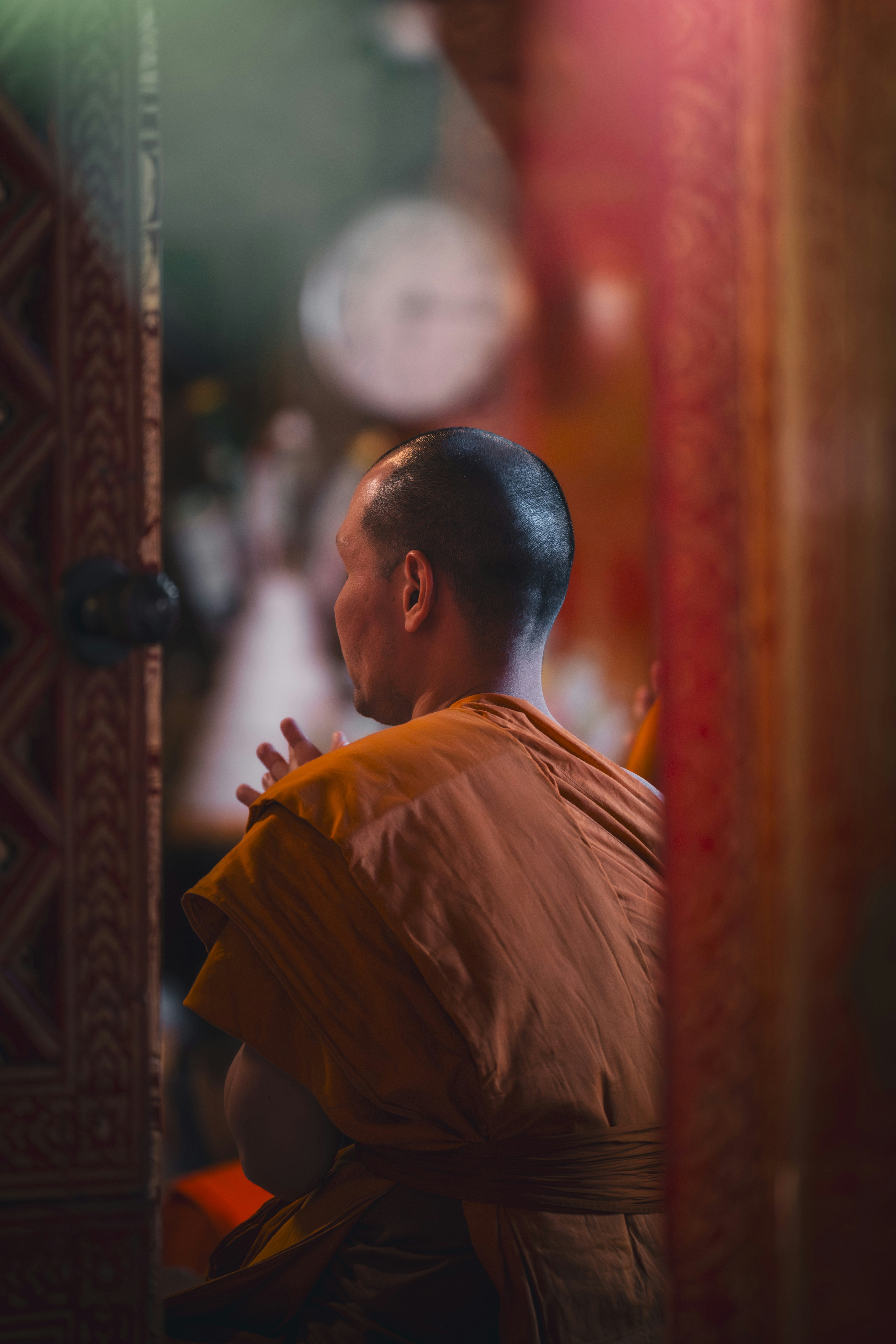 Silent Reverie in a Dim Temple Corridor