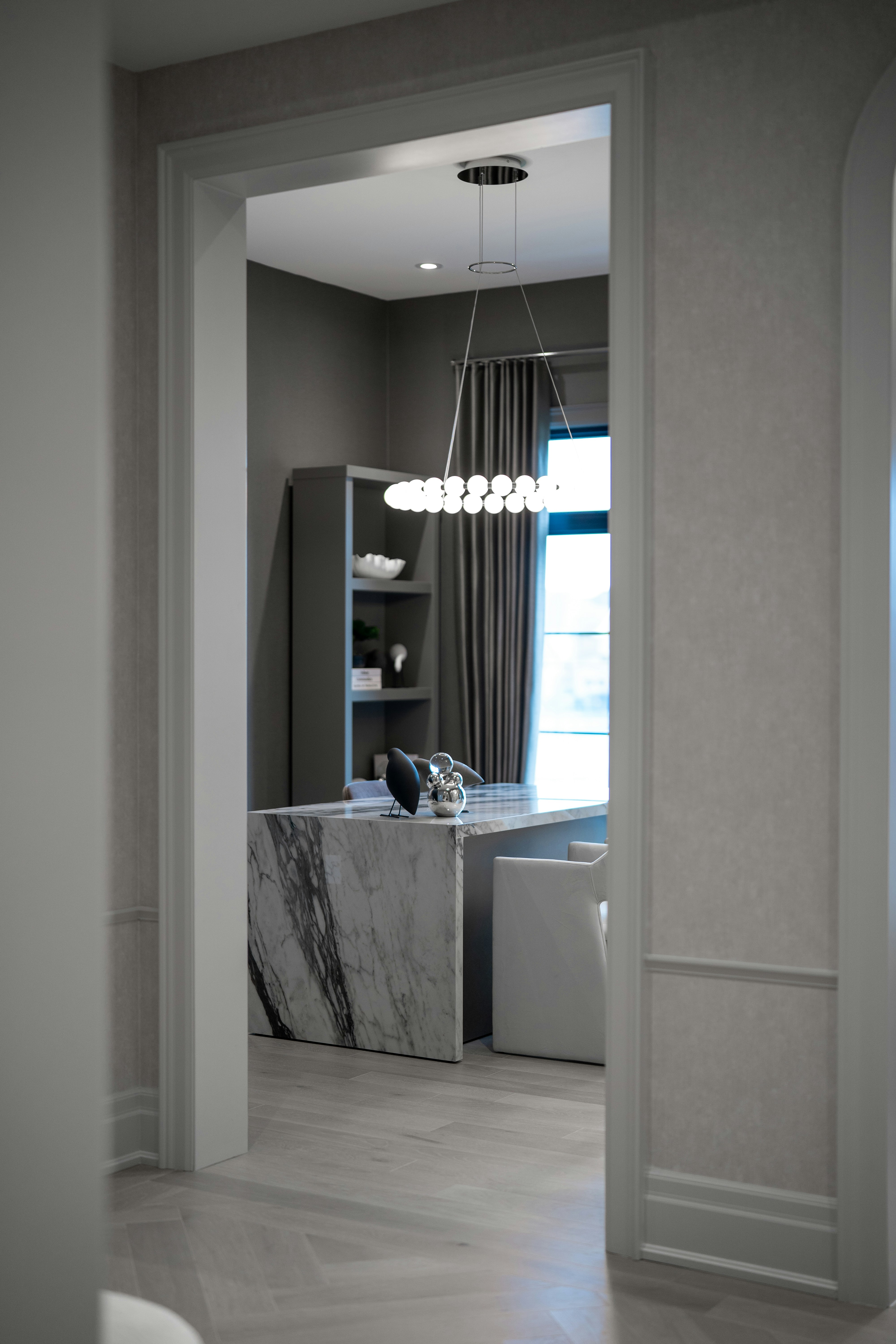 Marble Bar Counter Framed by an Elegant doorway