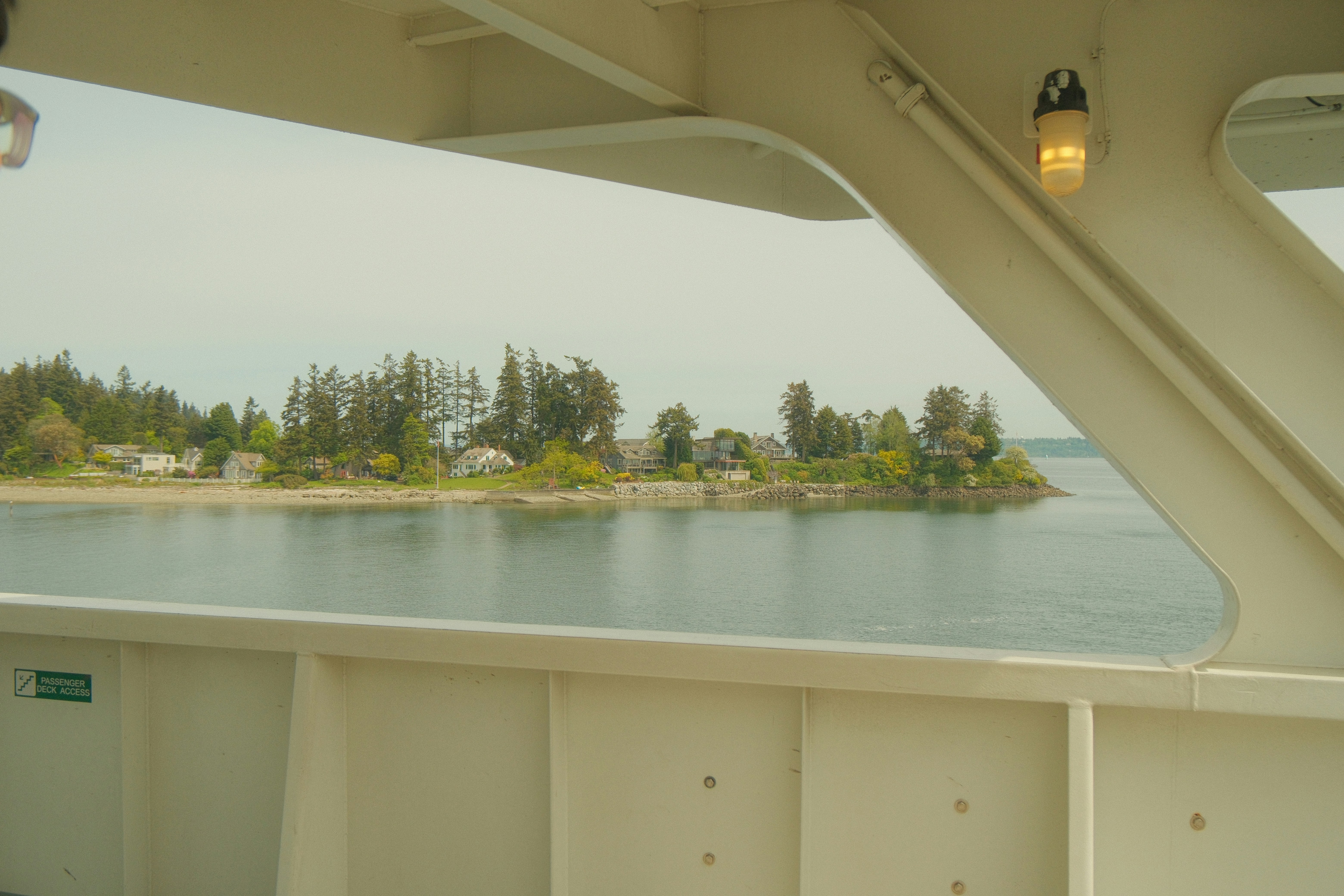 Windowed Horizon: A Quiet Passage Over Still Water