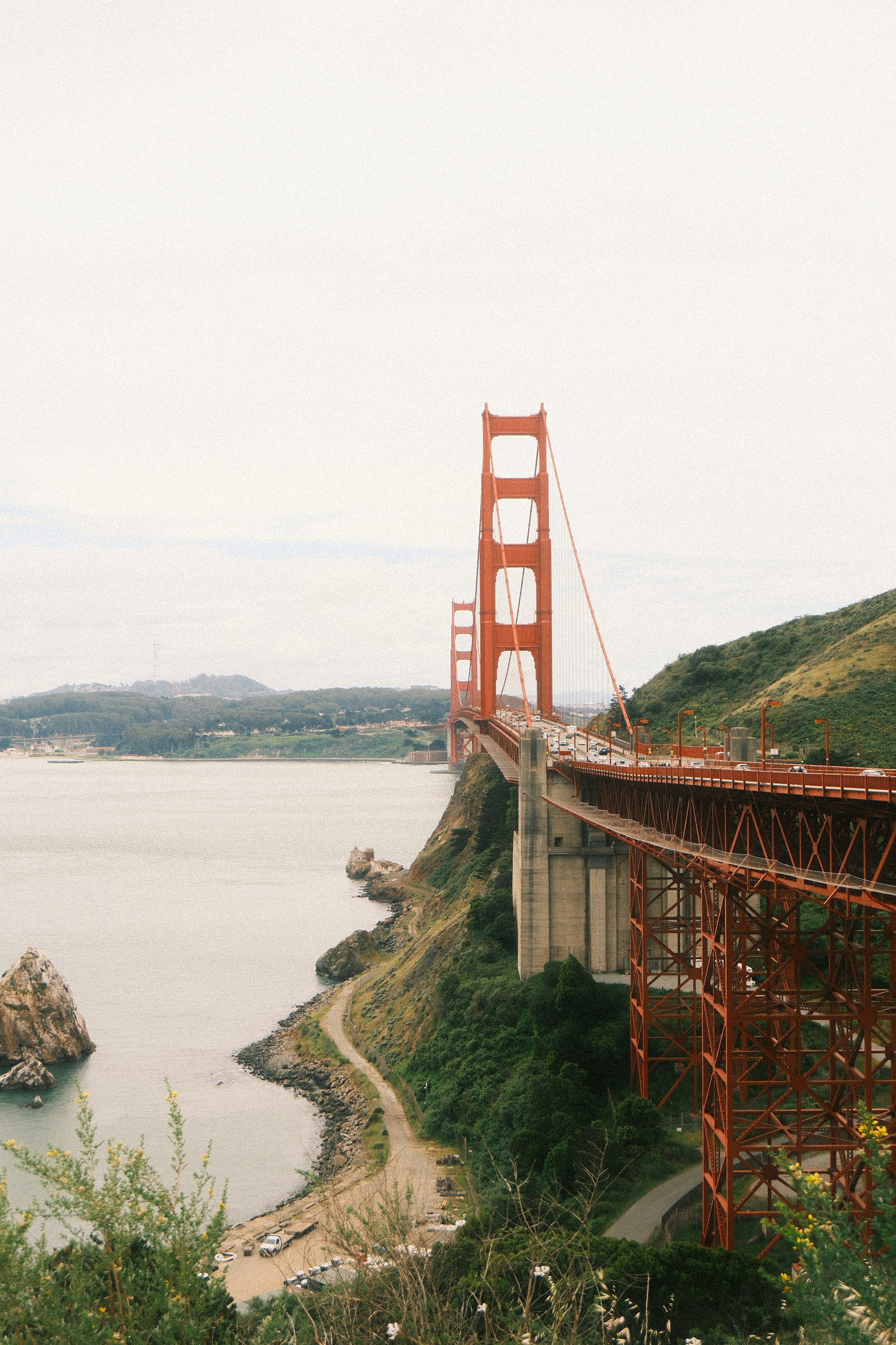 Crimson Span: A Lone View Along the Golden Gate