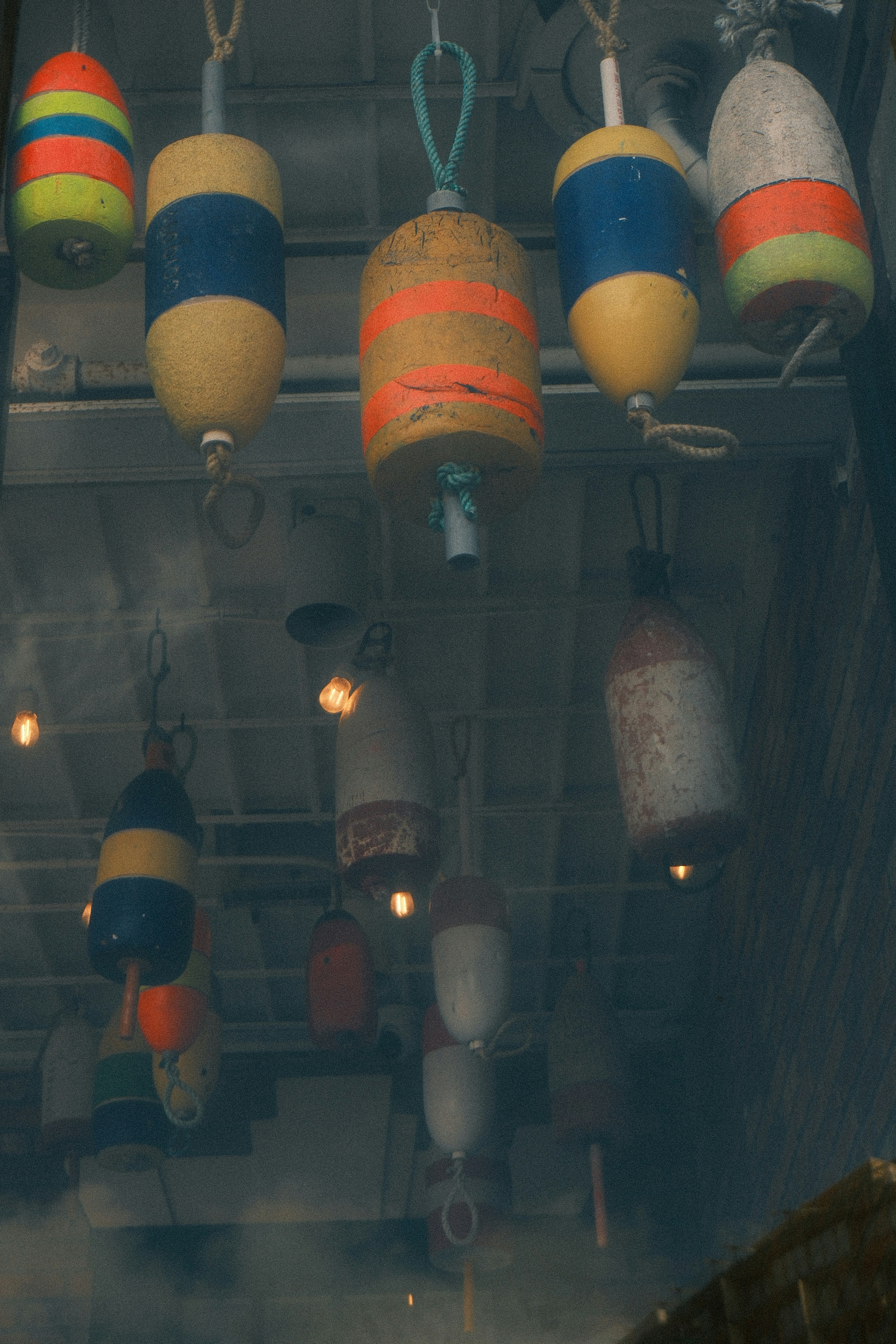 Floating buoys in a moody indoor harbor