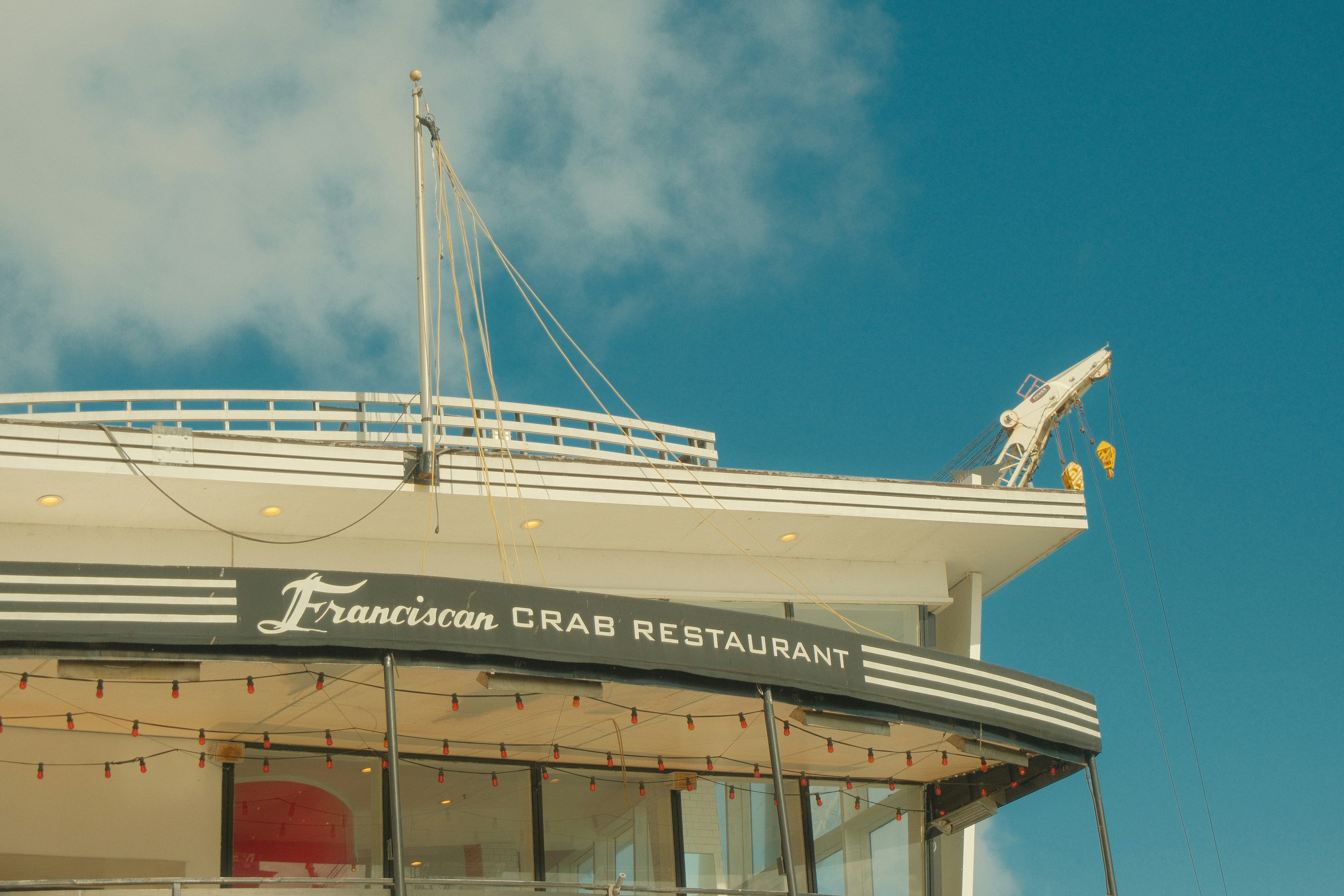 Dockside Bistro Signage: Sanity in Steel and Sky