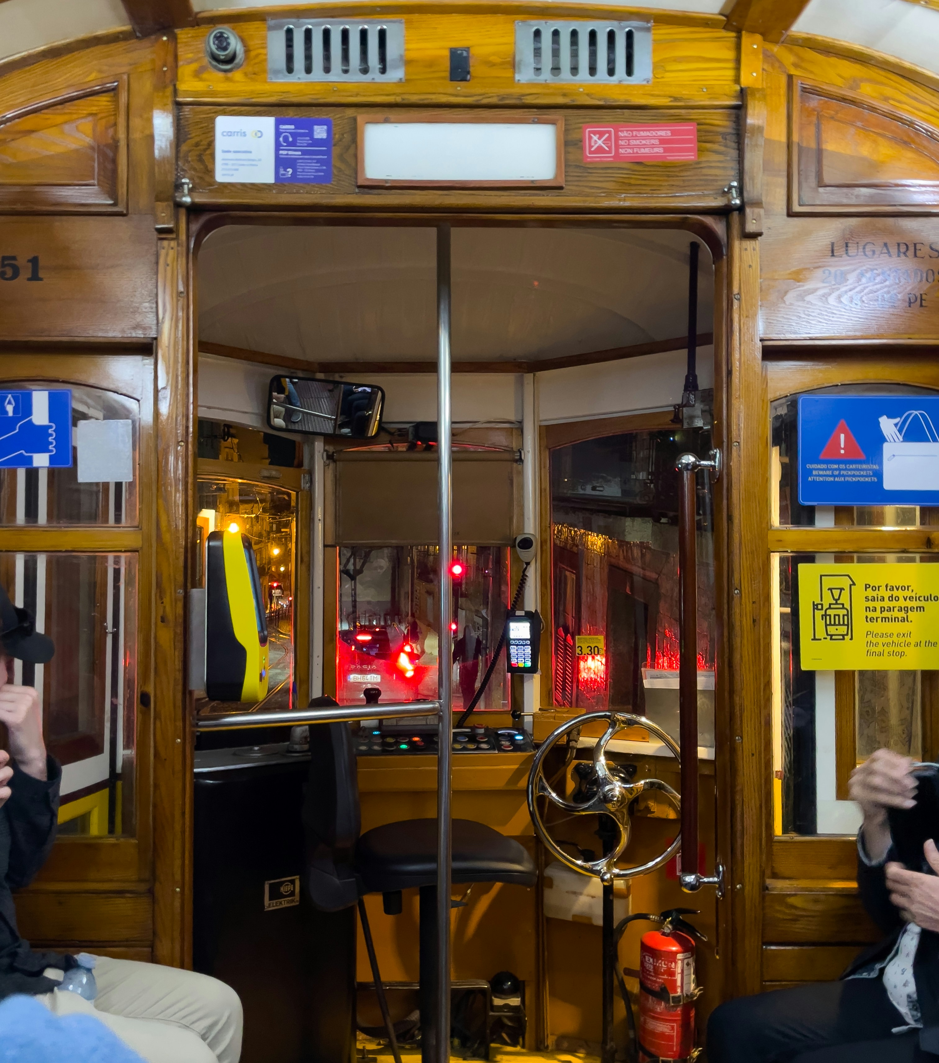 Inside the Old Streetcar: A Golden Cabin Amid City Lights