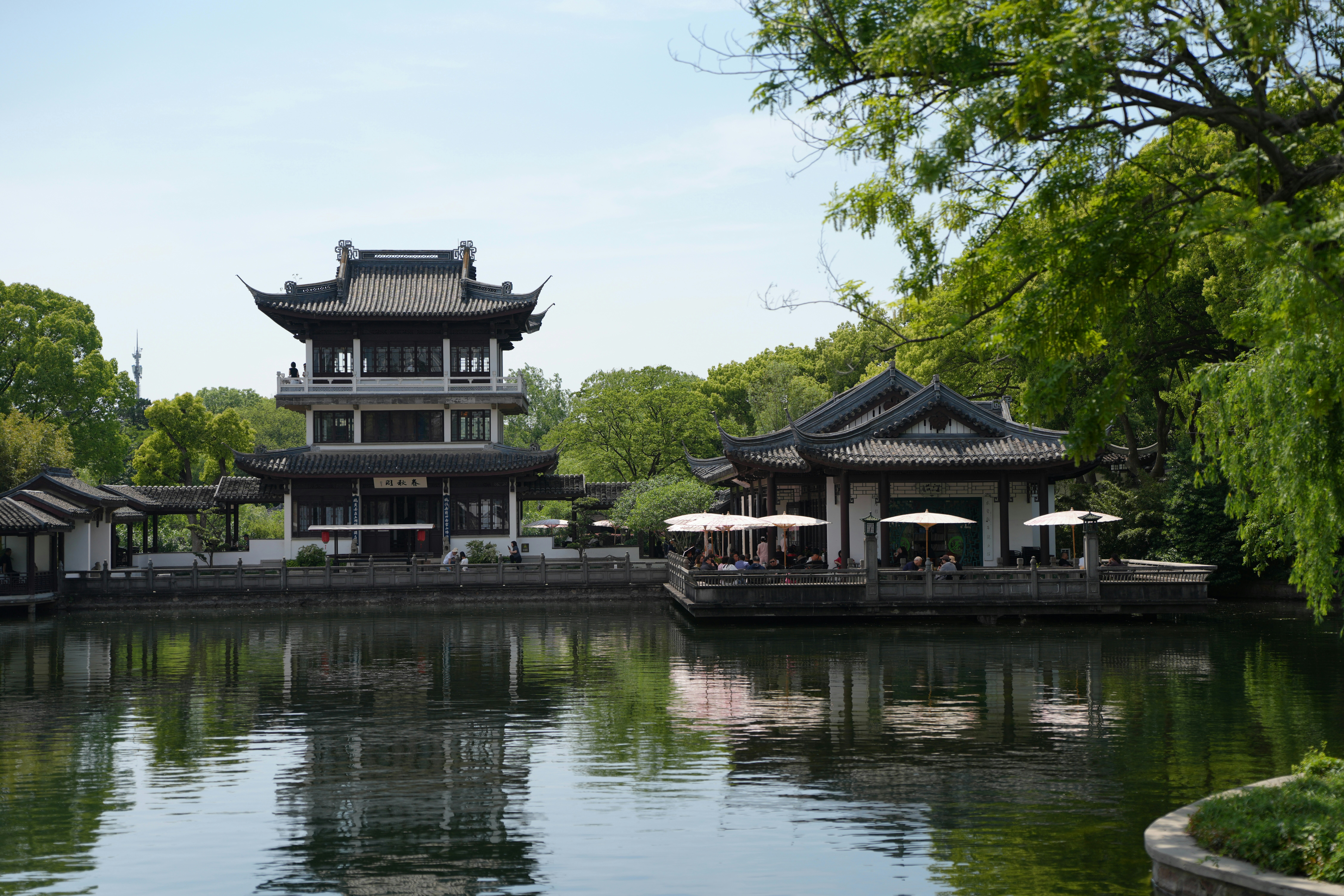 Temple Reflections Across a Tranquil Lake
