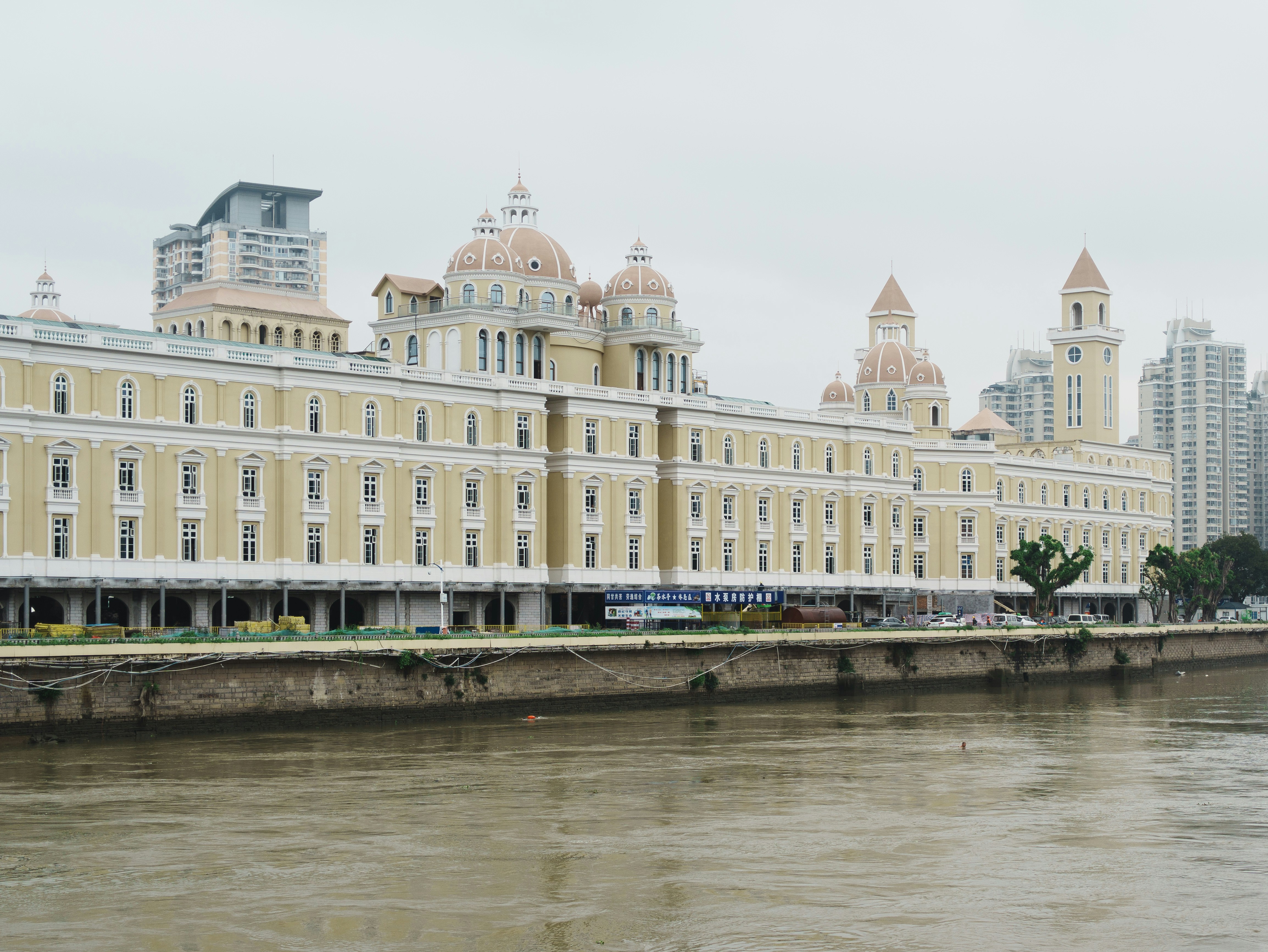 Riverside Regency: Classical Domes and Modern Towers Along the River