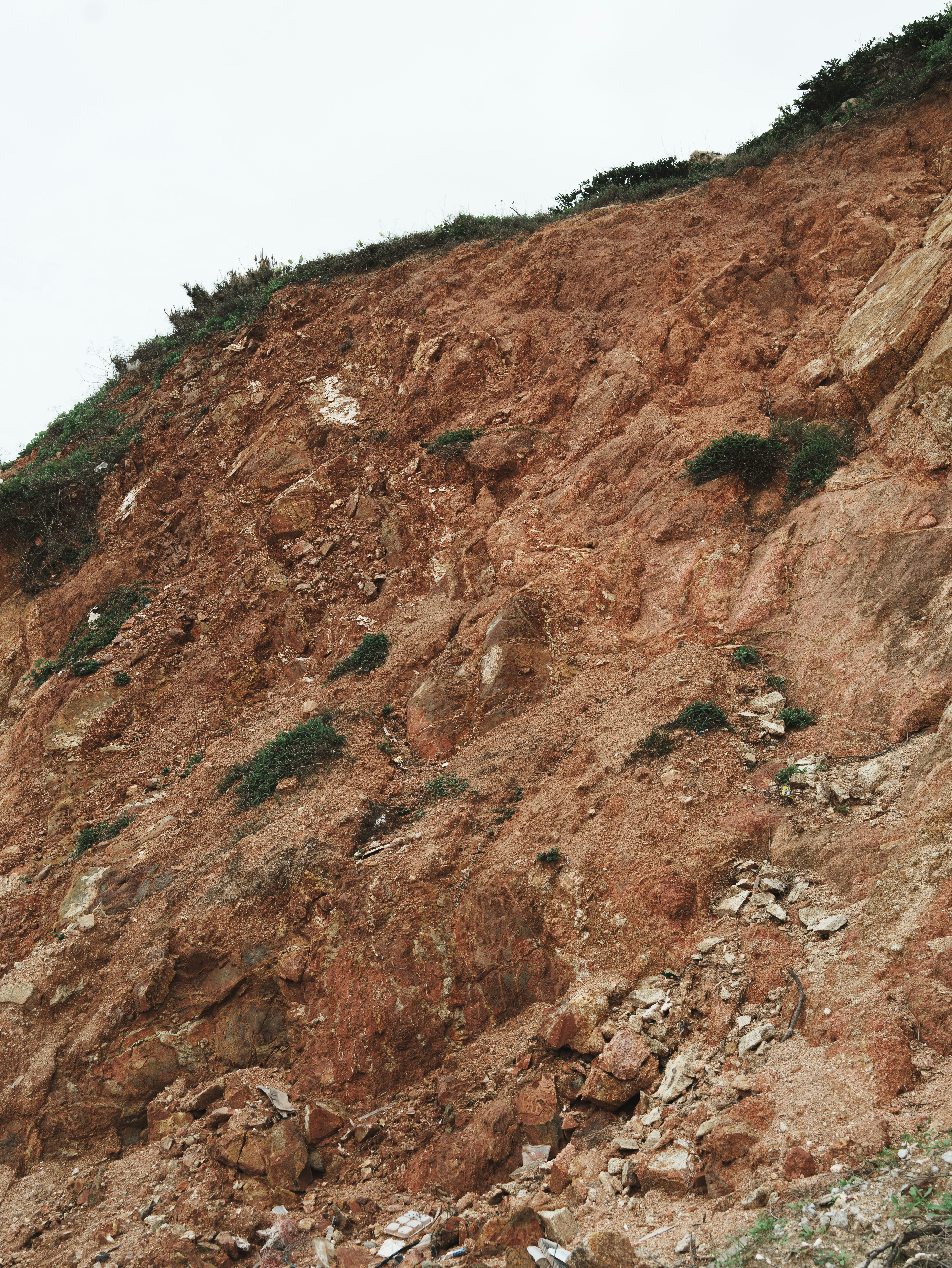 Rugged Red Slope: A Cascade of Crumbled Tones