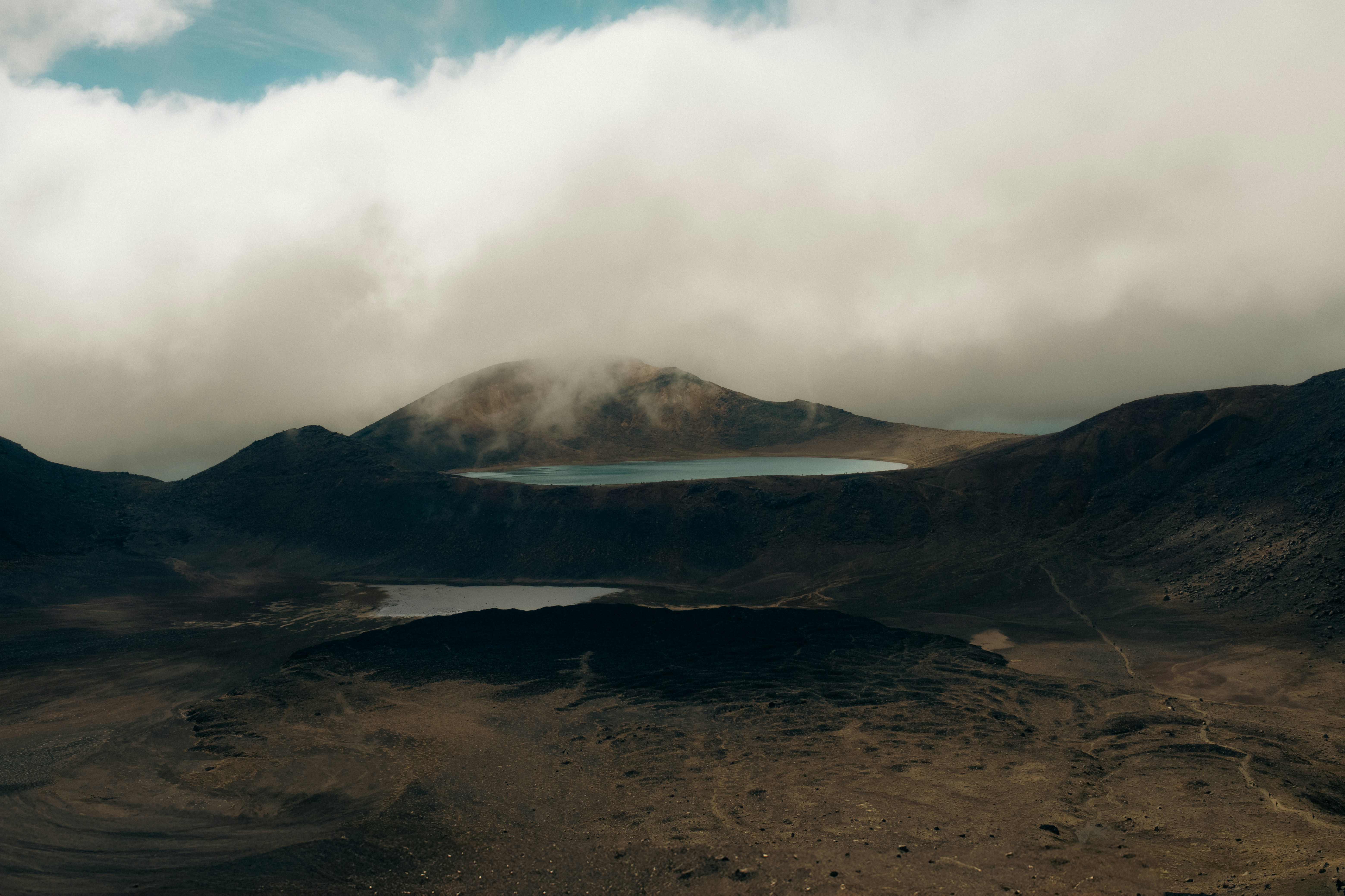 Misty Crater Lake in a Desolate Highlands Sunset