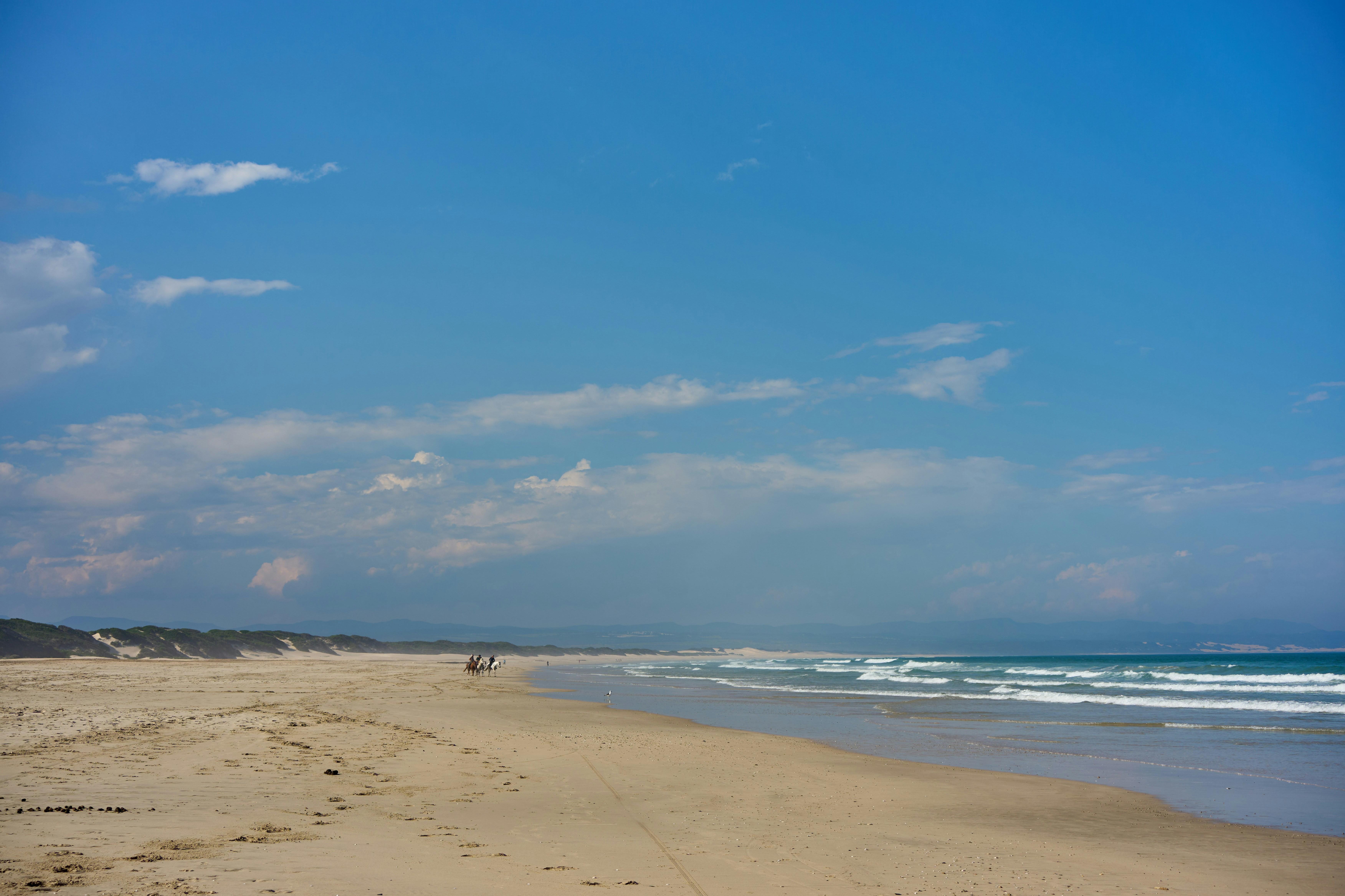 Silent Horizon: A Quiet Strand Under a Wide Sky
