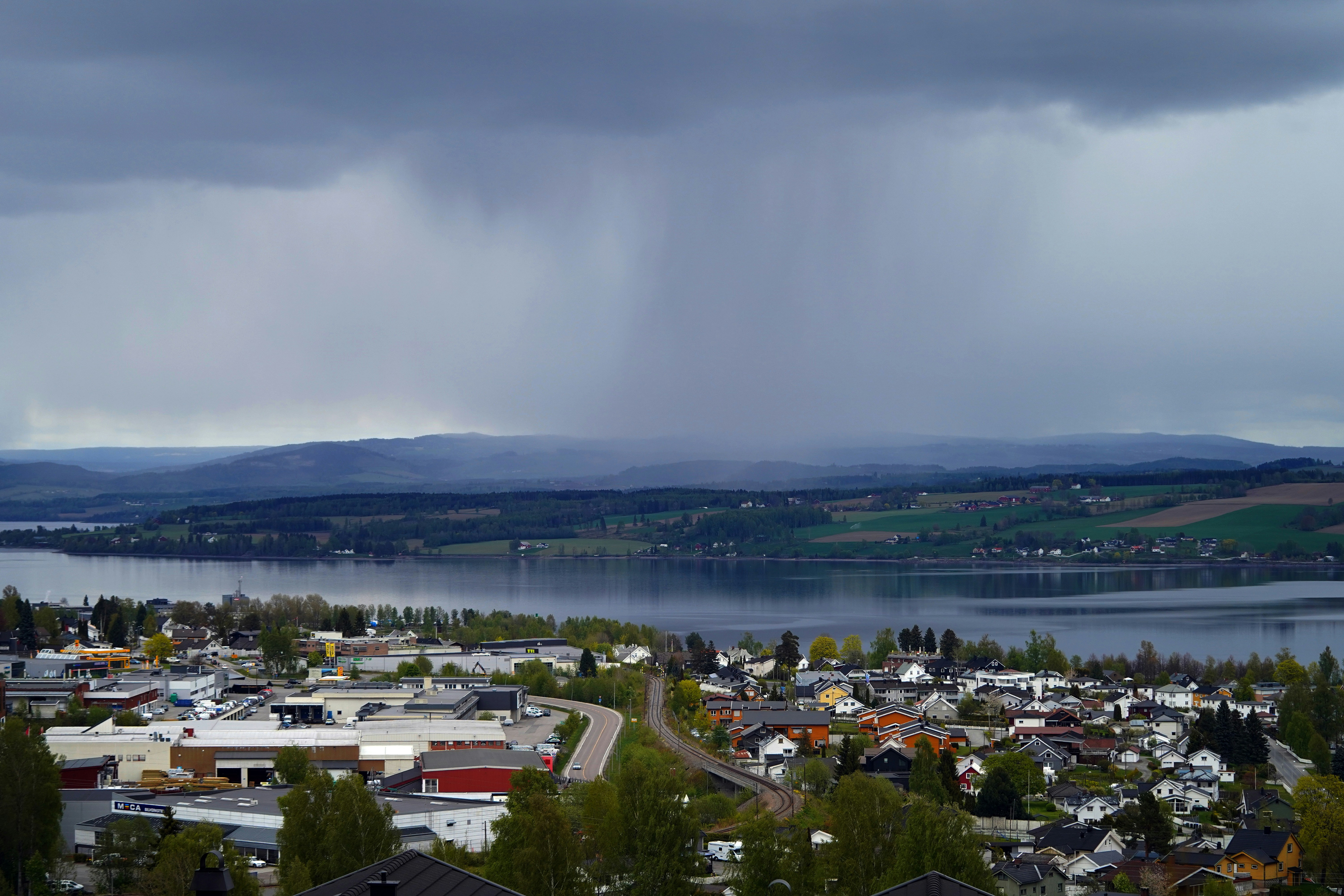 Storm Over the Lake: Townscape Under Dramatic Skies