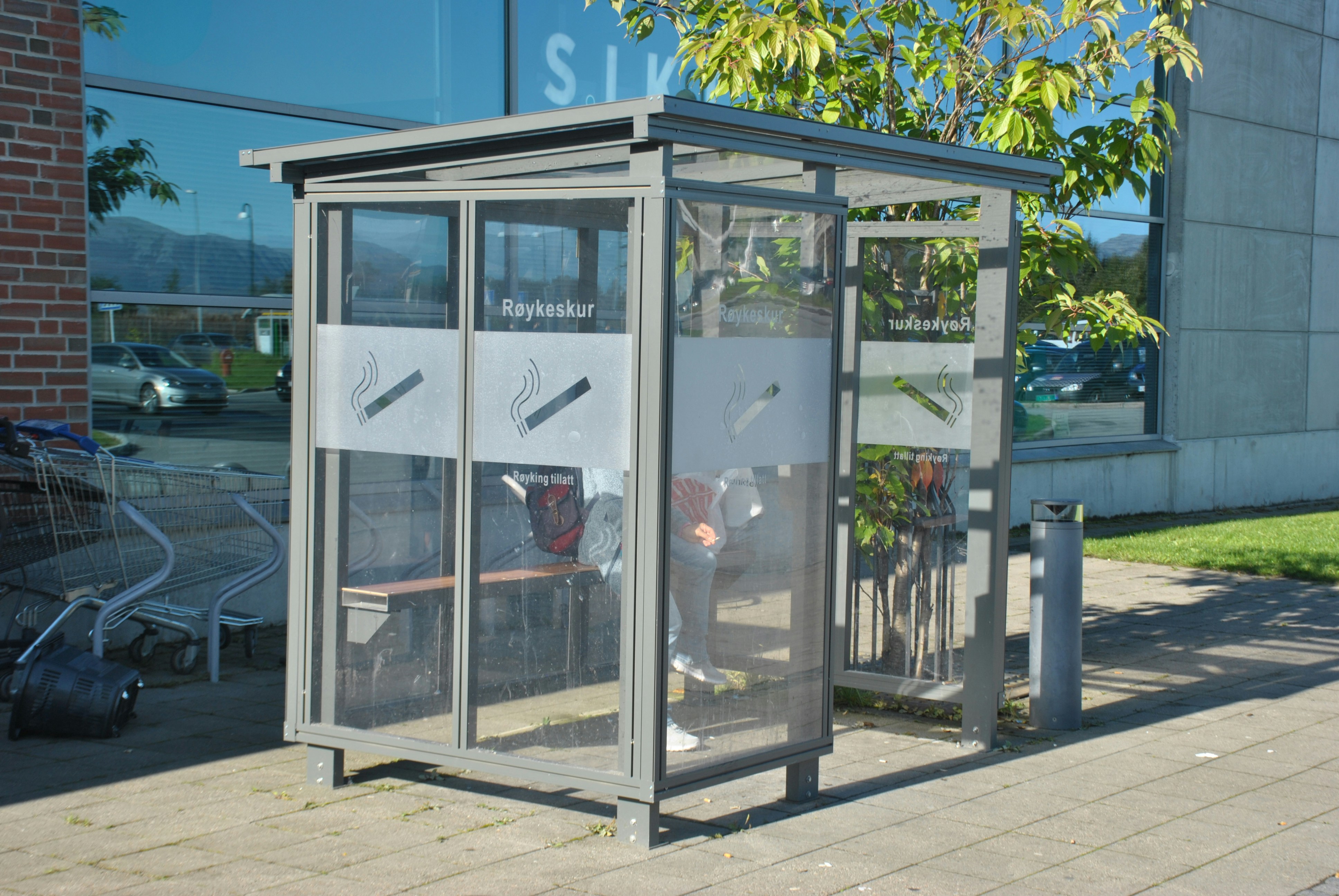 Glass Booth at the Stop: A Street-Level Moment