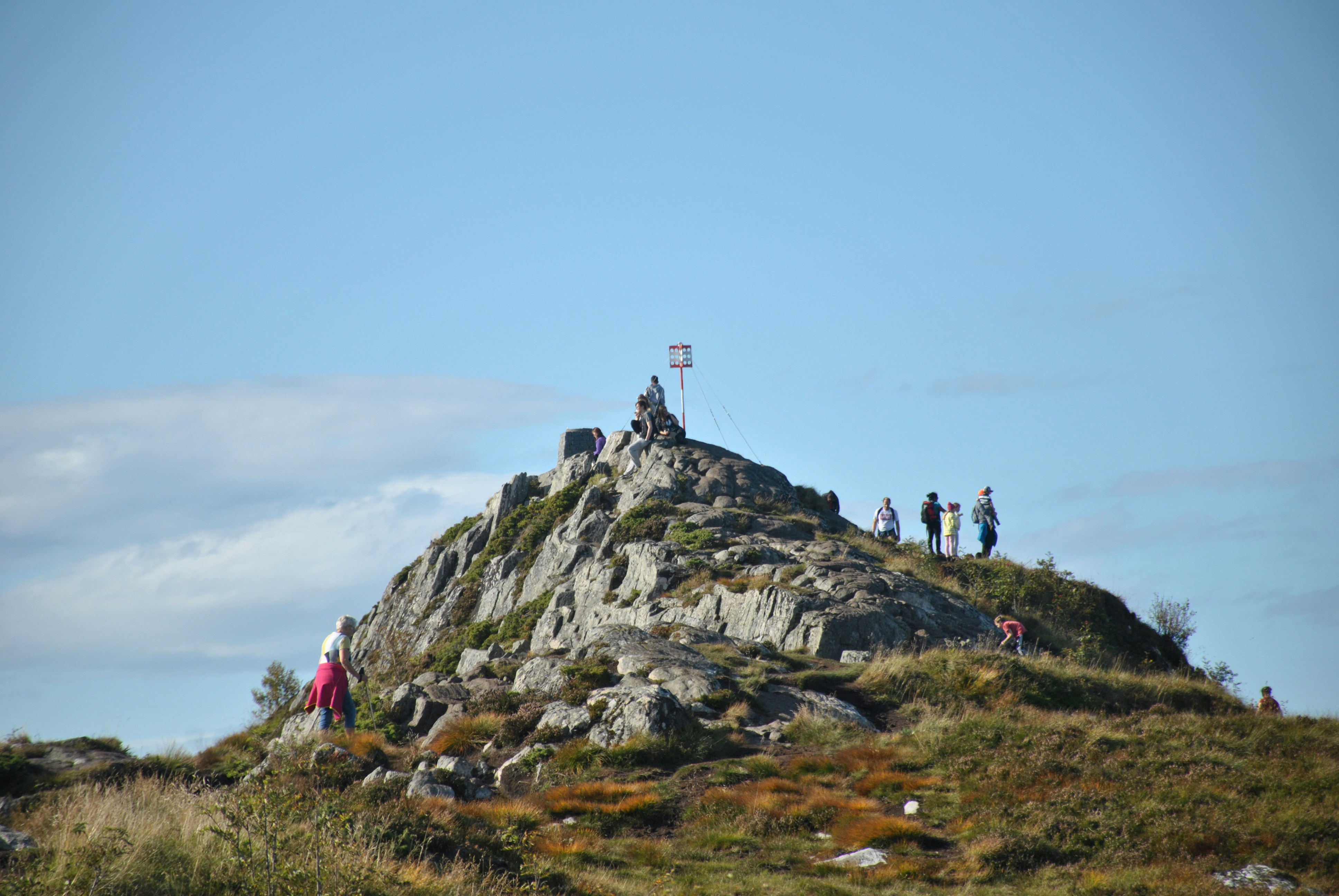Crested Summit: A Small Band at the Peak