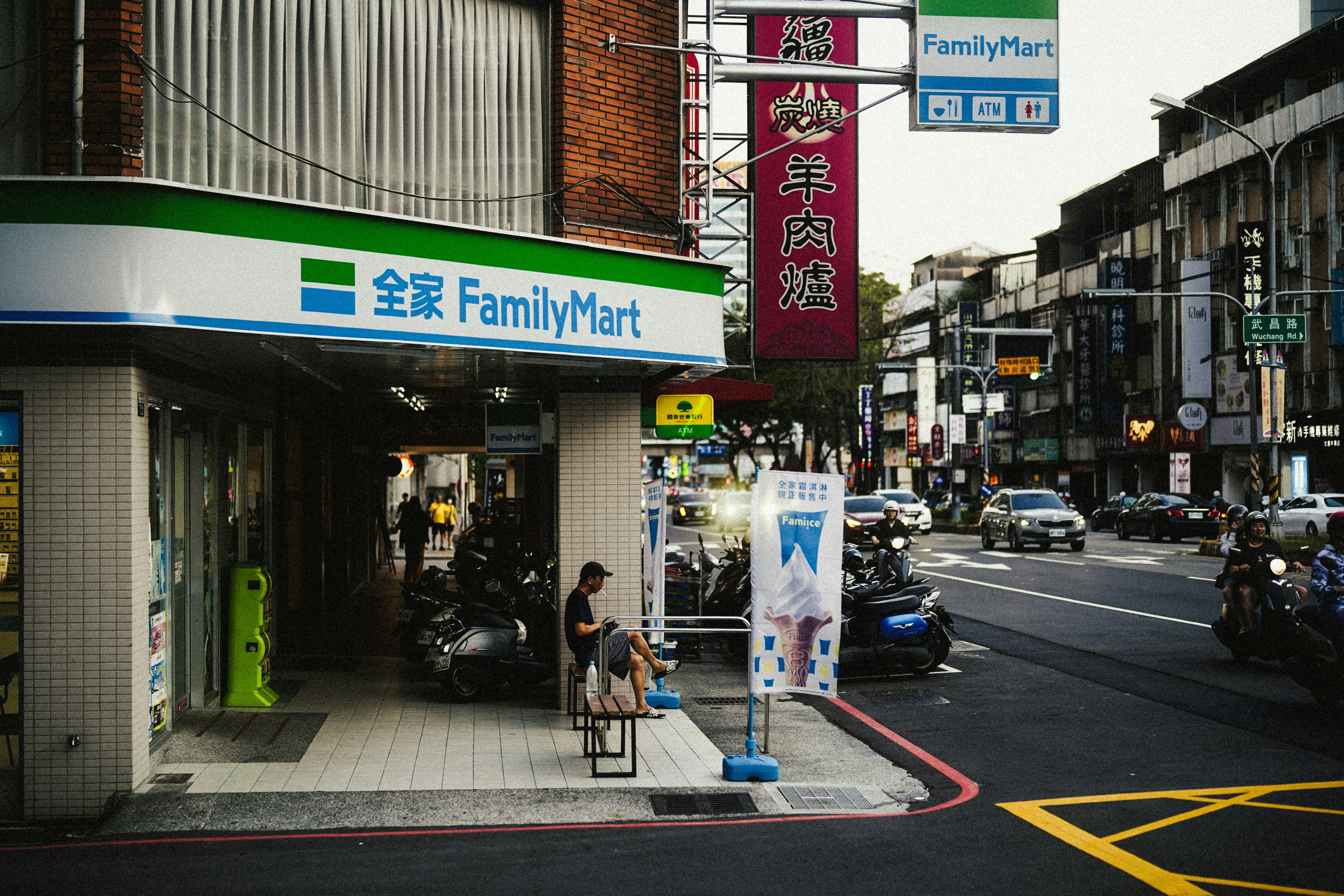 Corner Store Quietly Anchored in a Busy Tokyo Street