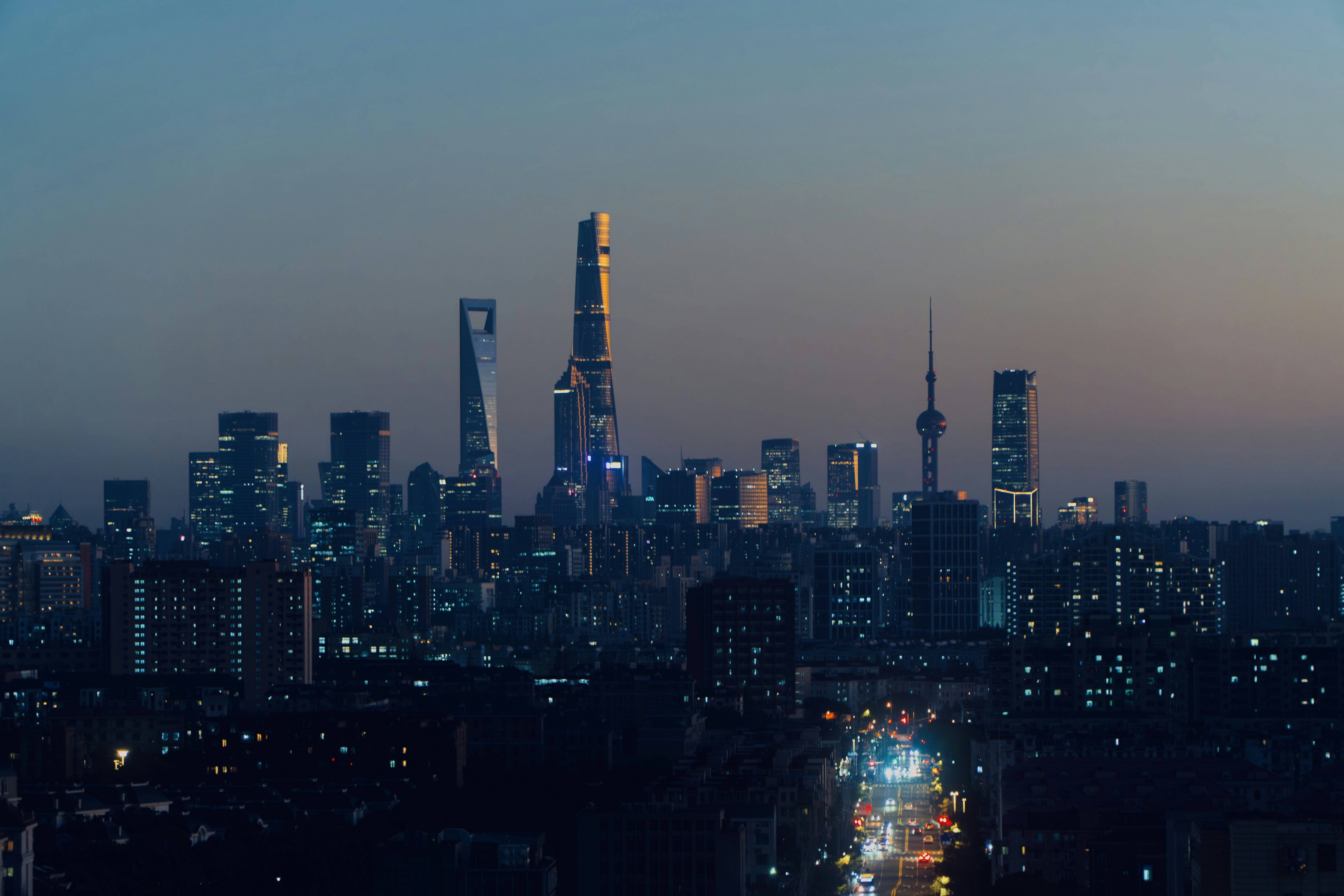 Modern cityscape with illuminated skyscrapers at dusk photo – Free ...