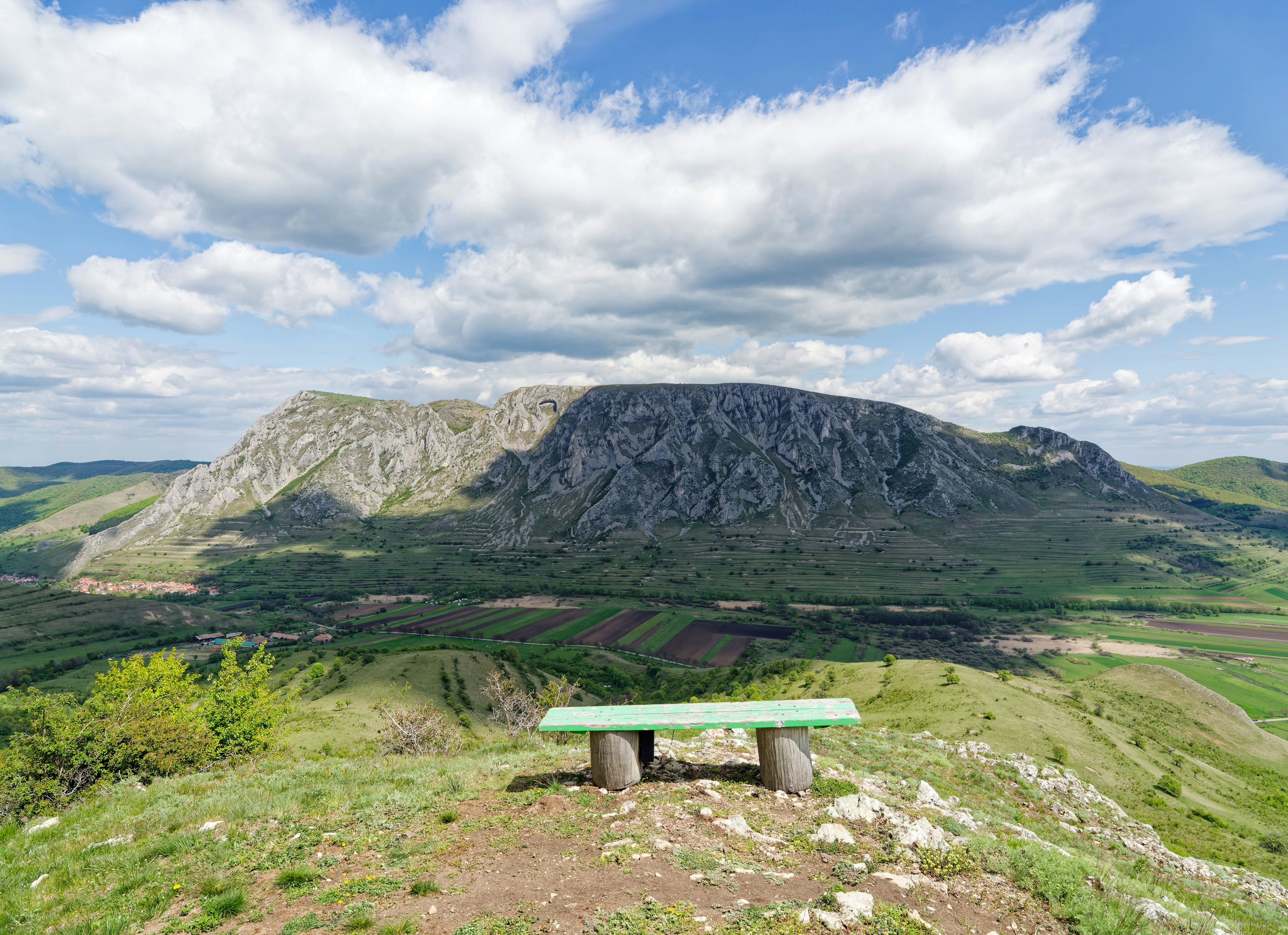 Bench Beneath the Gullied Ridge: A Panoramic Rest Stop