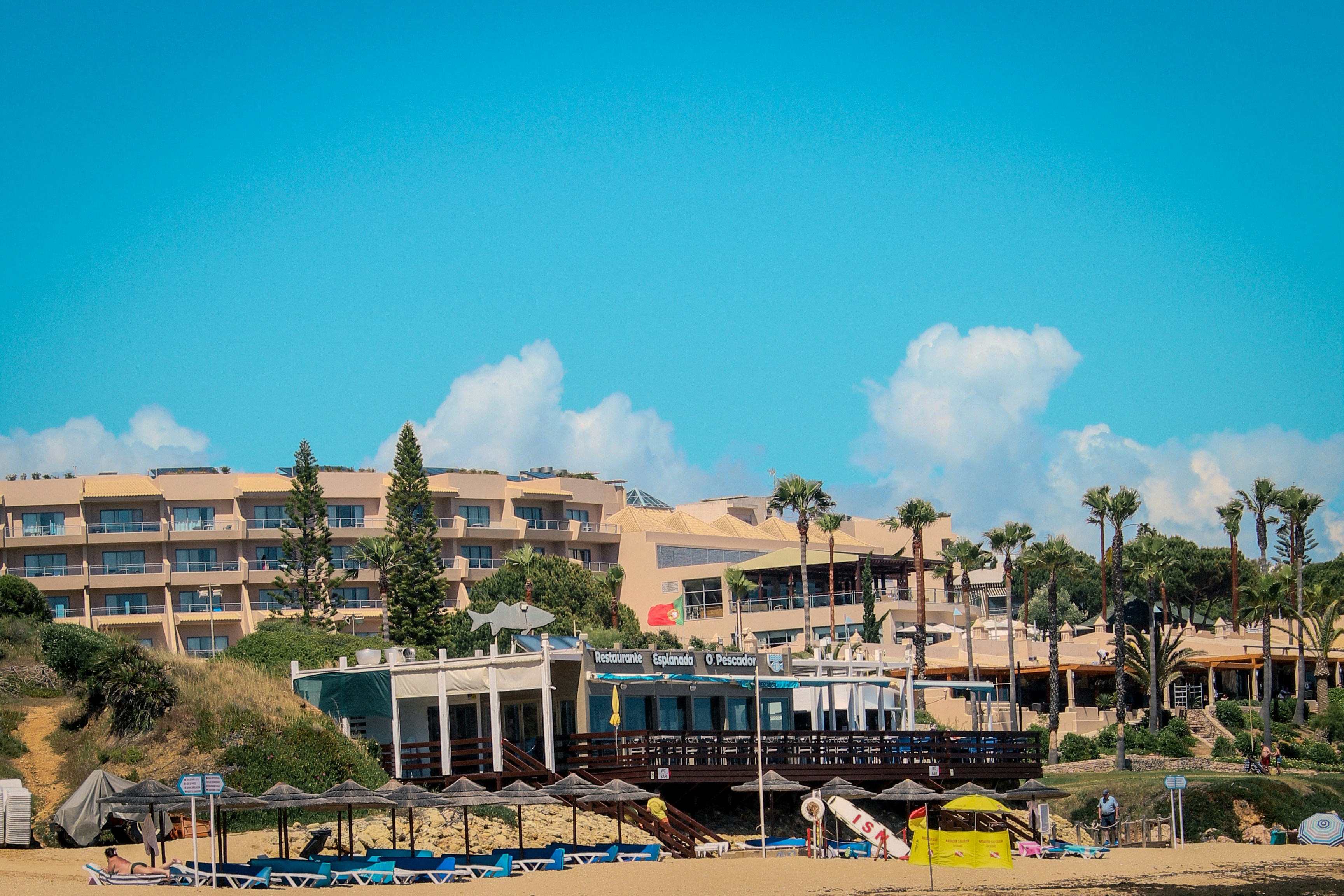 Coastline Resort Alma: BeachfrontAmenities Under a Clear Sky
