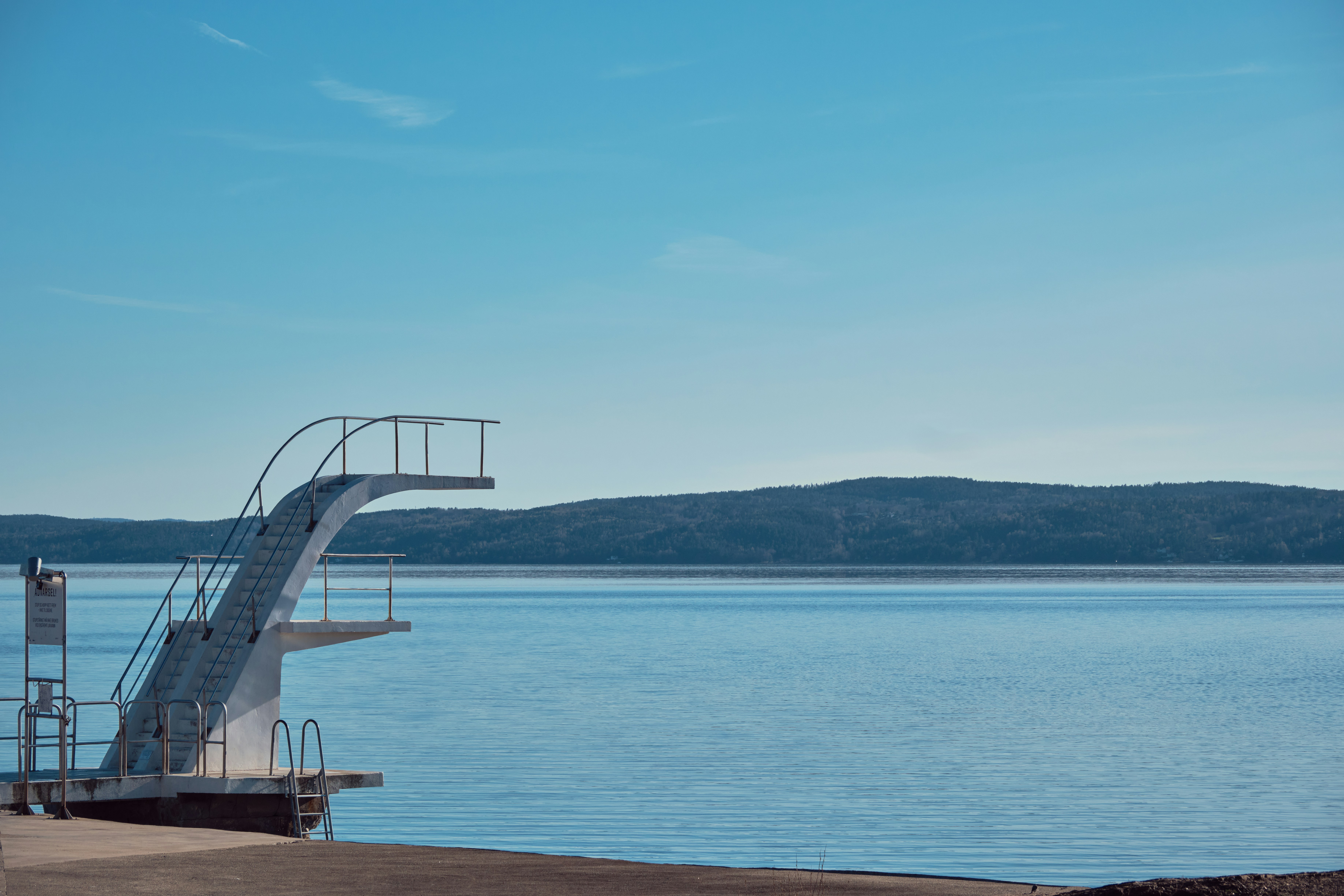 Docks at Distant Shore: Calm Blue Horizon