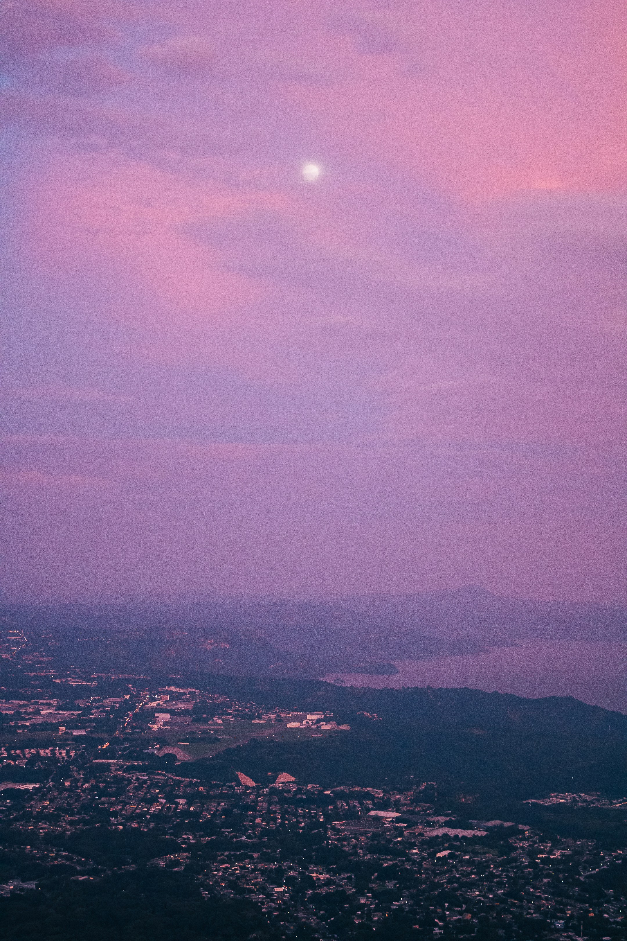 Lilac Skies Over a Quiet Coastal Horizon