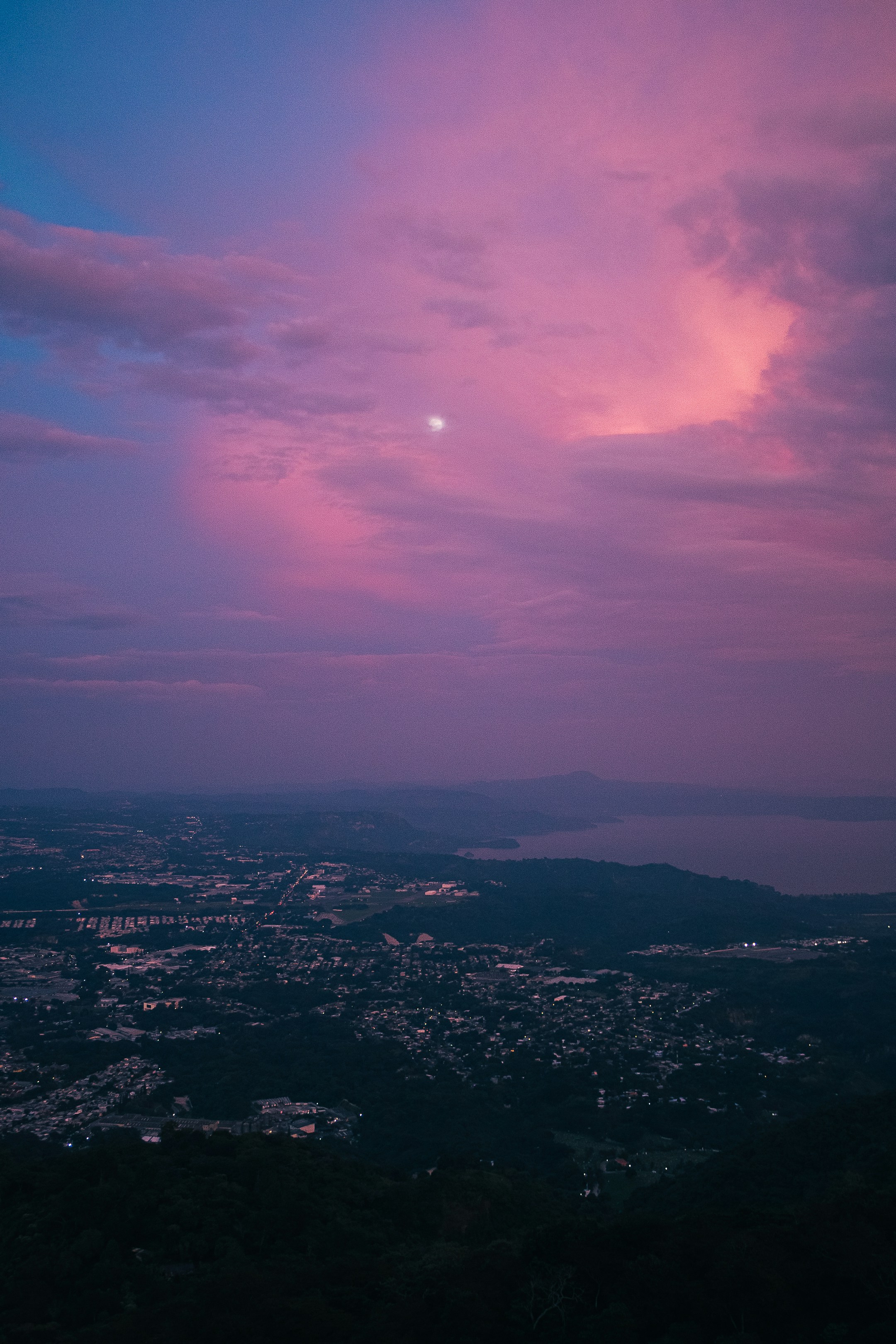 Pastel Twilight Over a Winding Coastal Plain