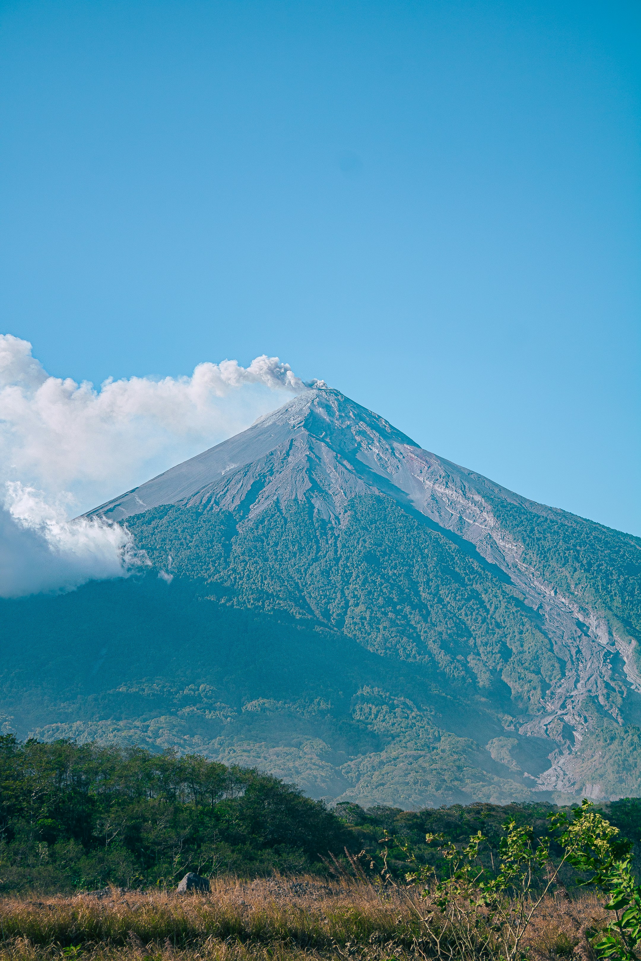 Conical Peak Across a Quiet Plain