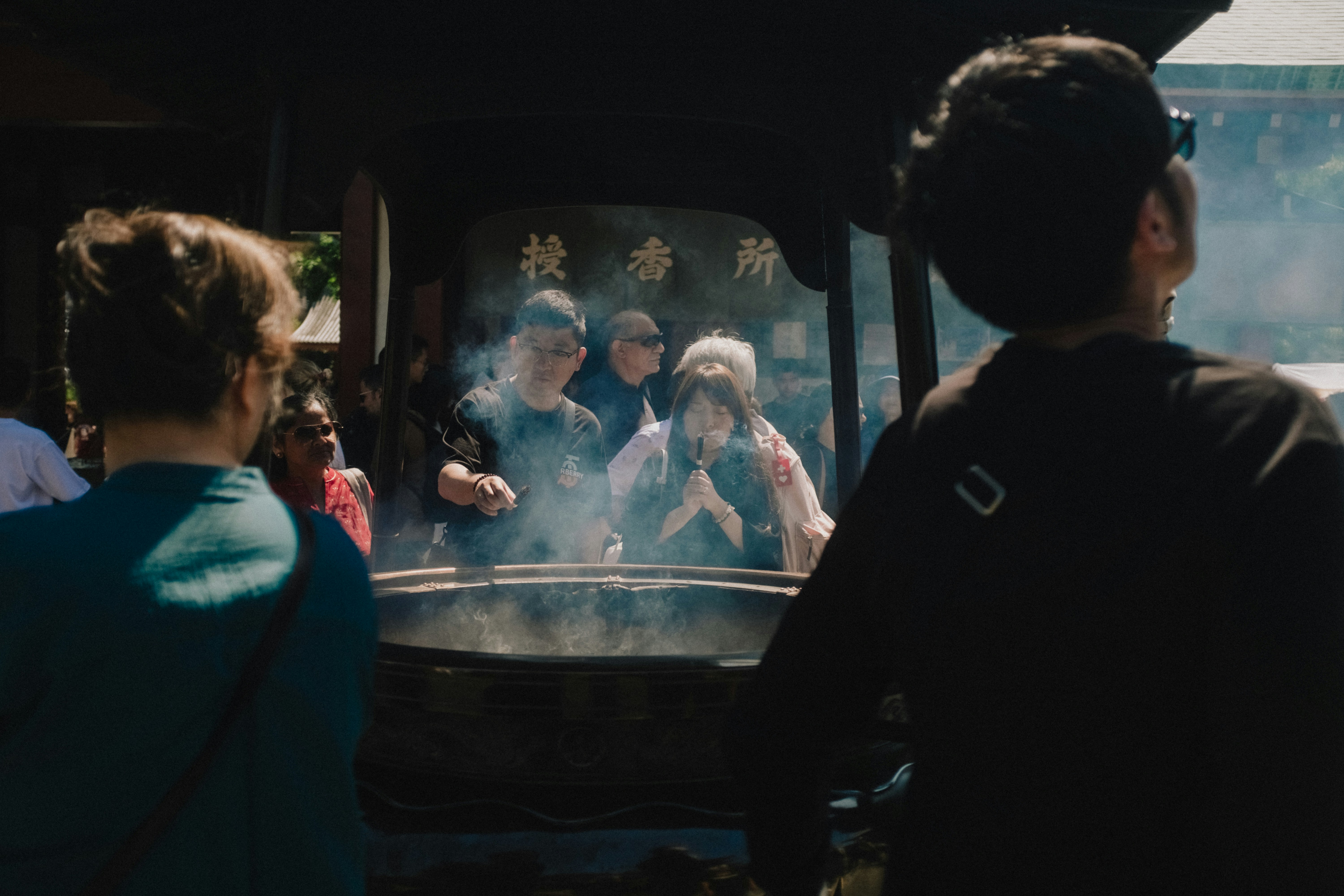 Smoke and Silent Gaze at the Bus Stop Exhibit