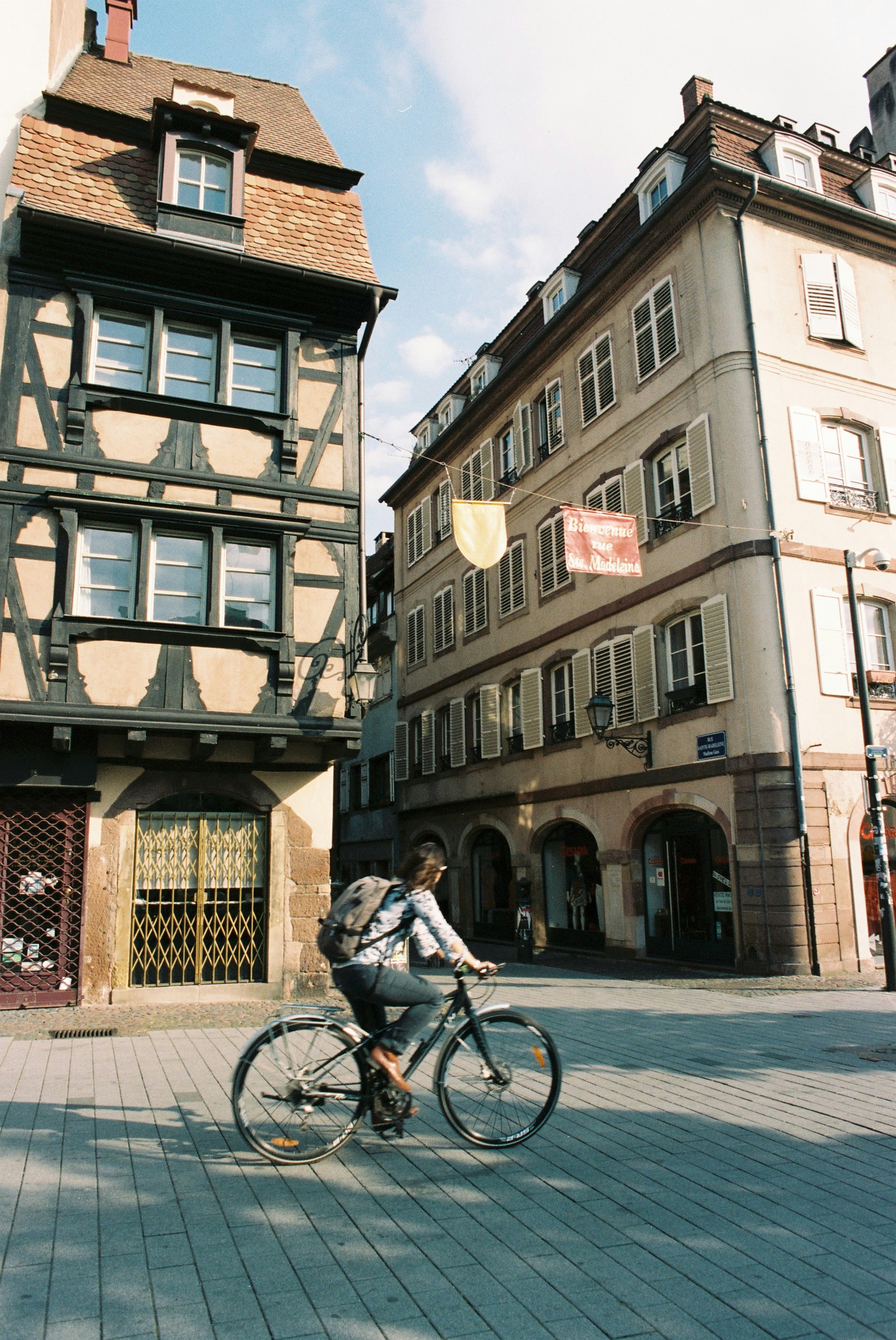 Cyclist in a sunlit European Street