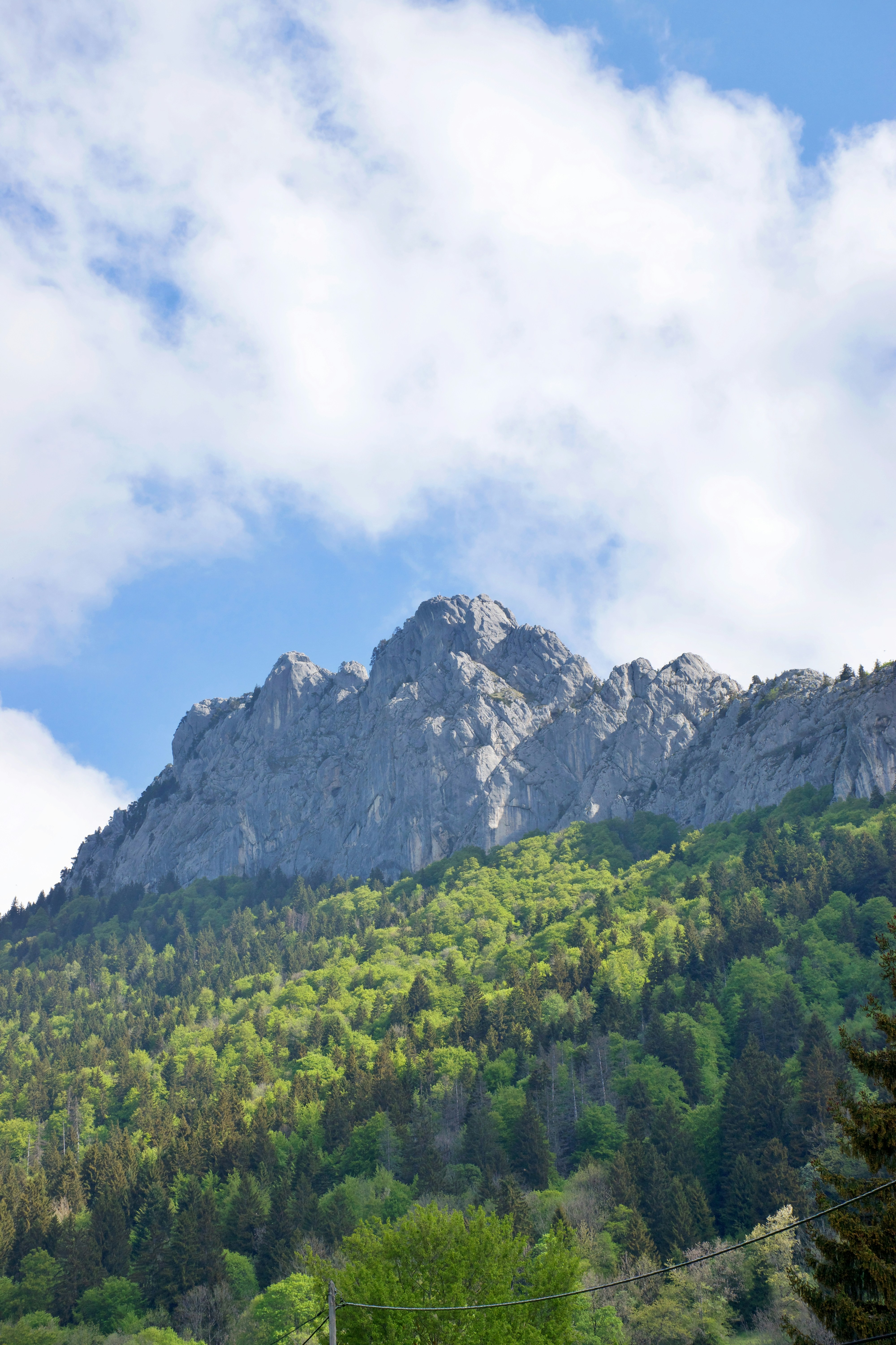 Cascading Peaks Under Cavernous Sky