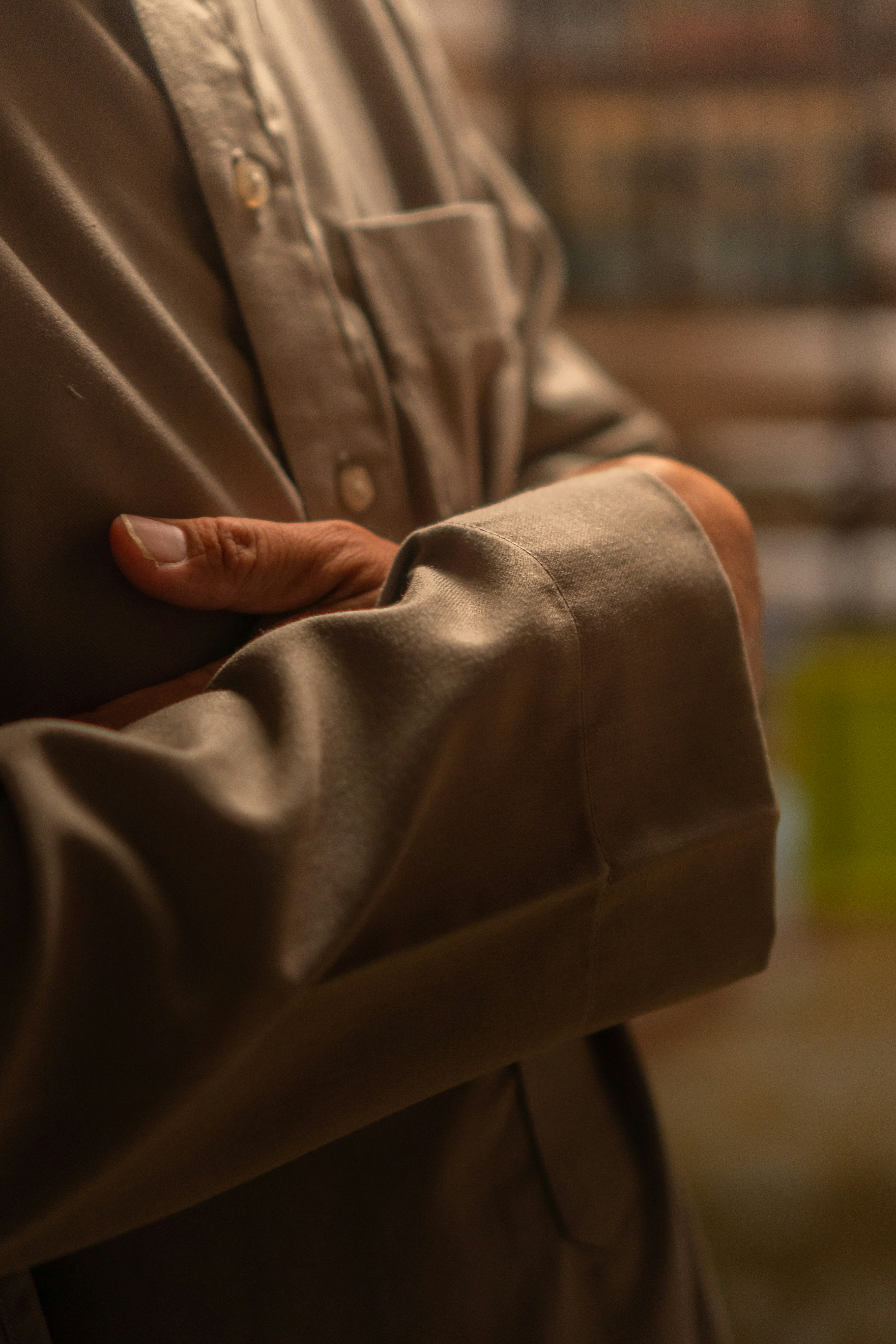 Sleeved in stillness: a cuffed moment in warm light