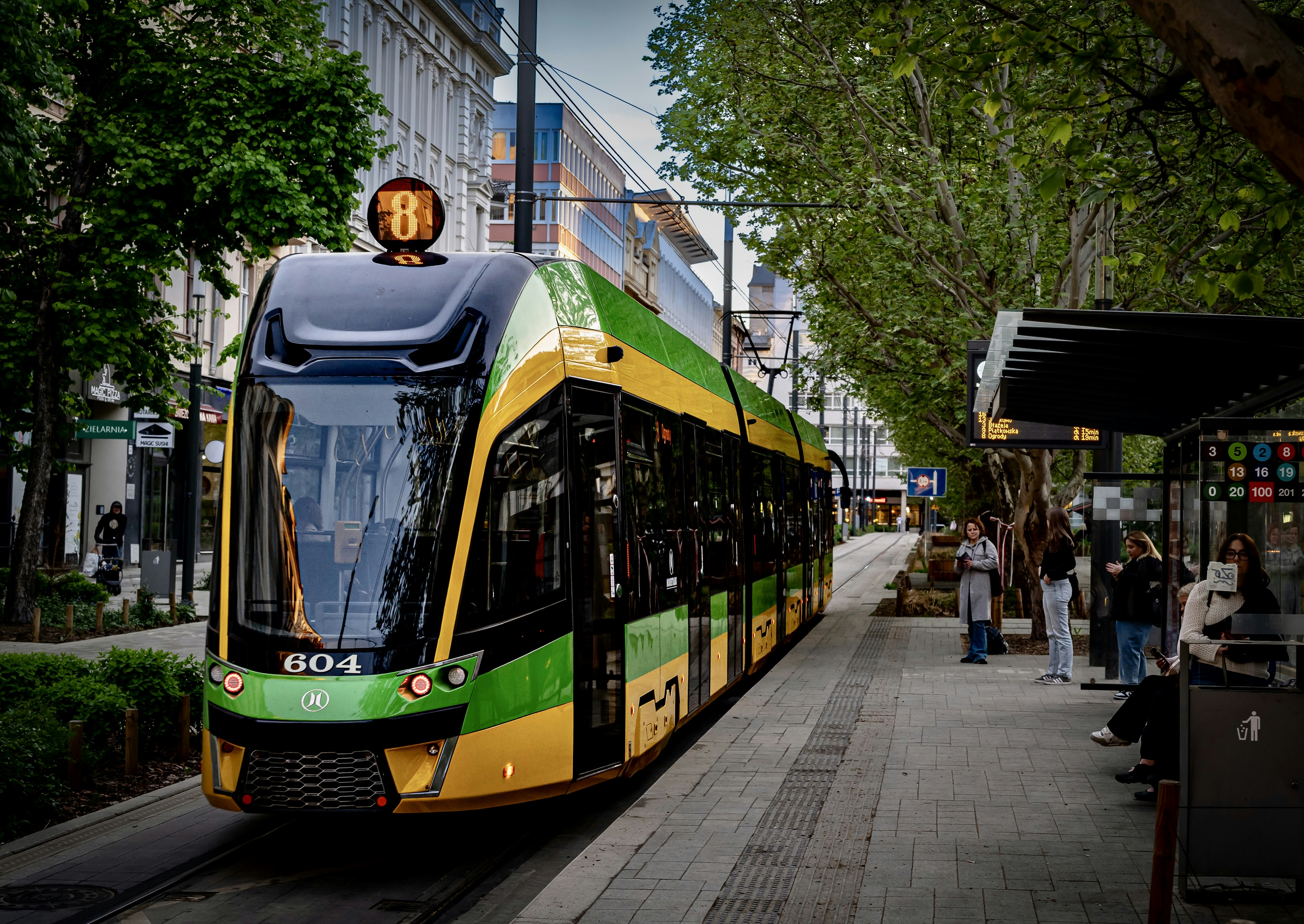 Emerald-Cold Tram in City Light