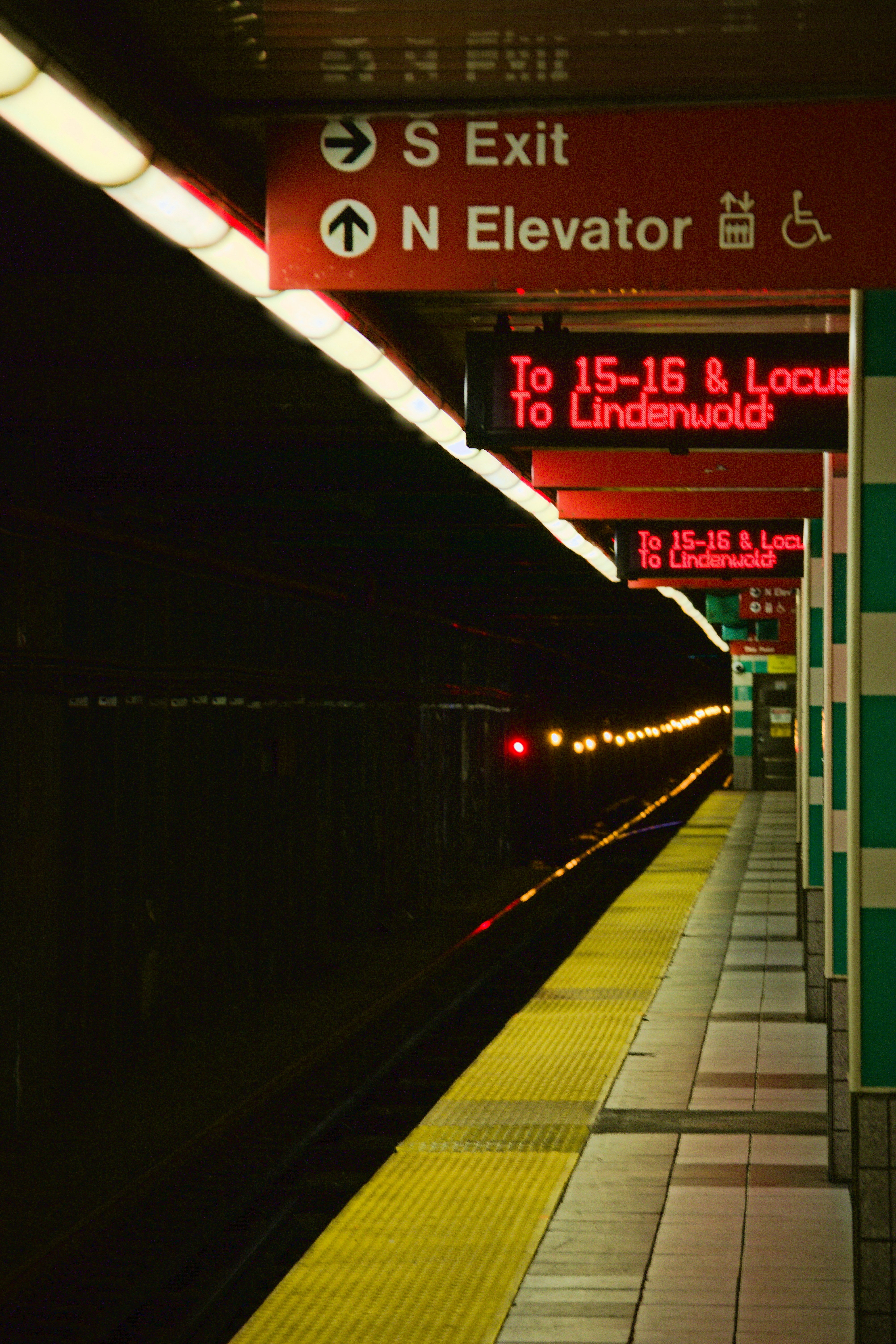 Neon Signals at the Platform: A Night at the Subway Entrance