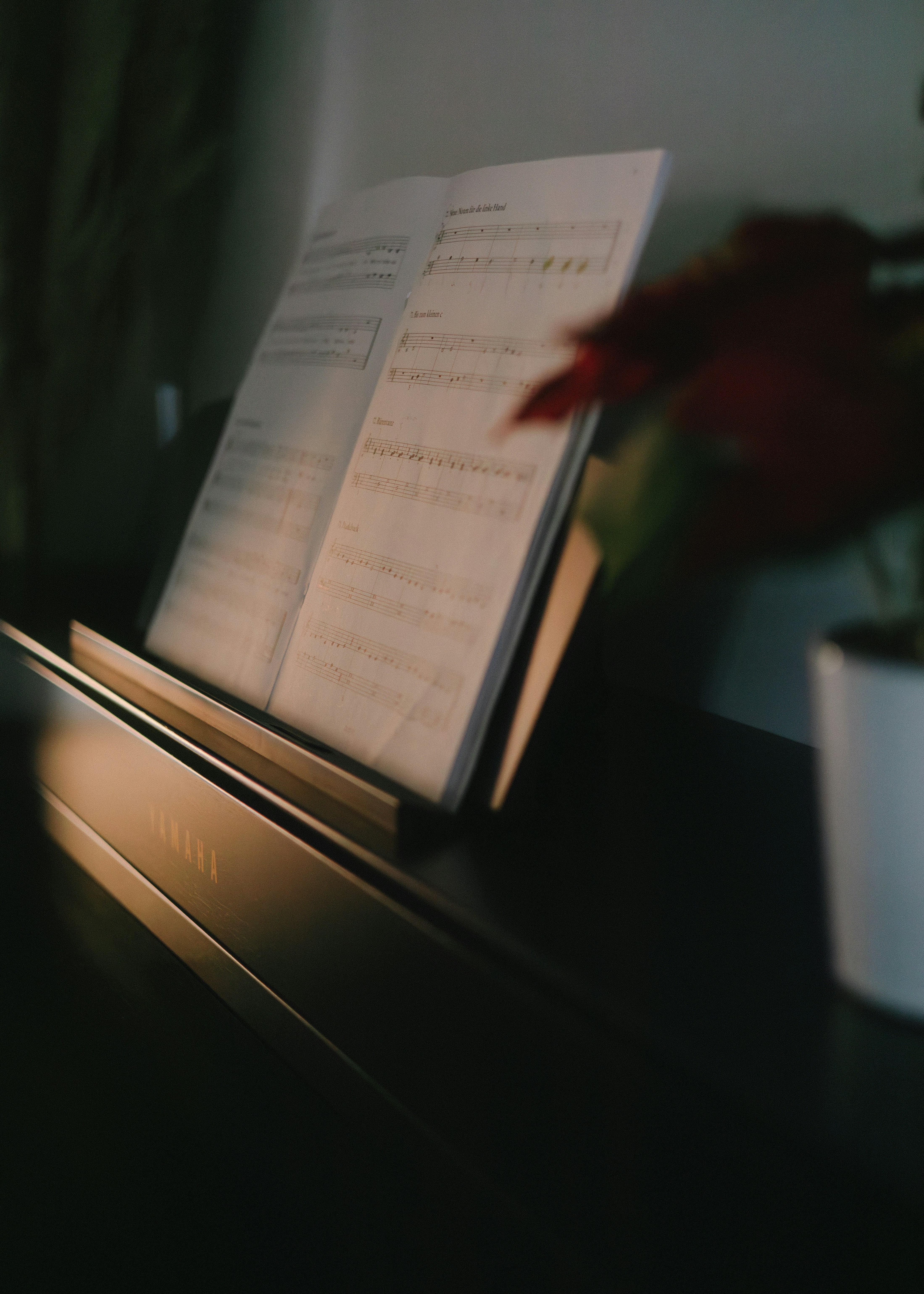 Soft Light on Silent Keys: A Piano with Open Sheet Music
