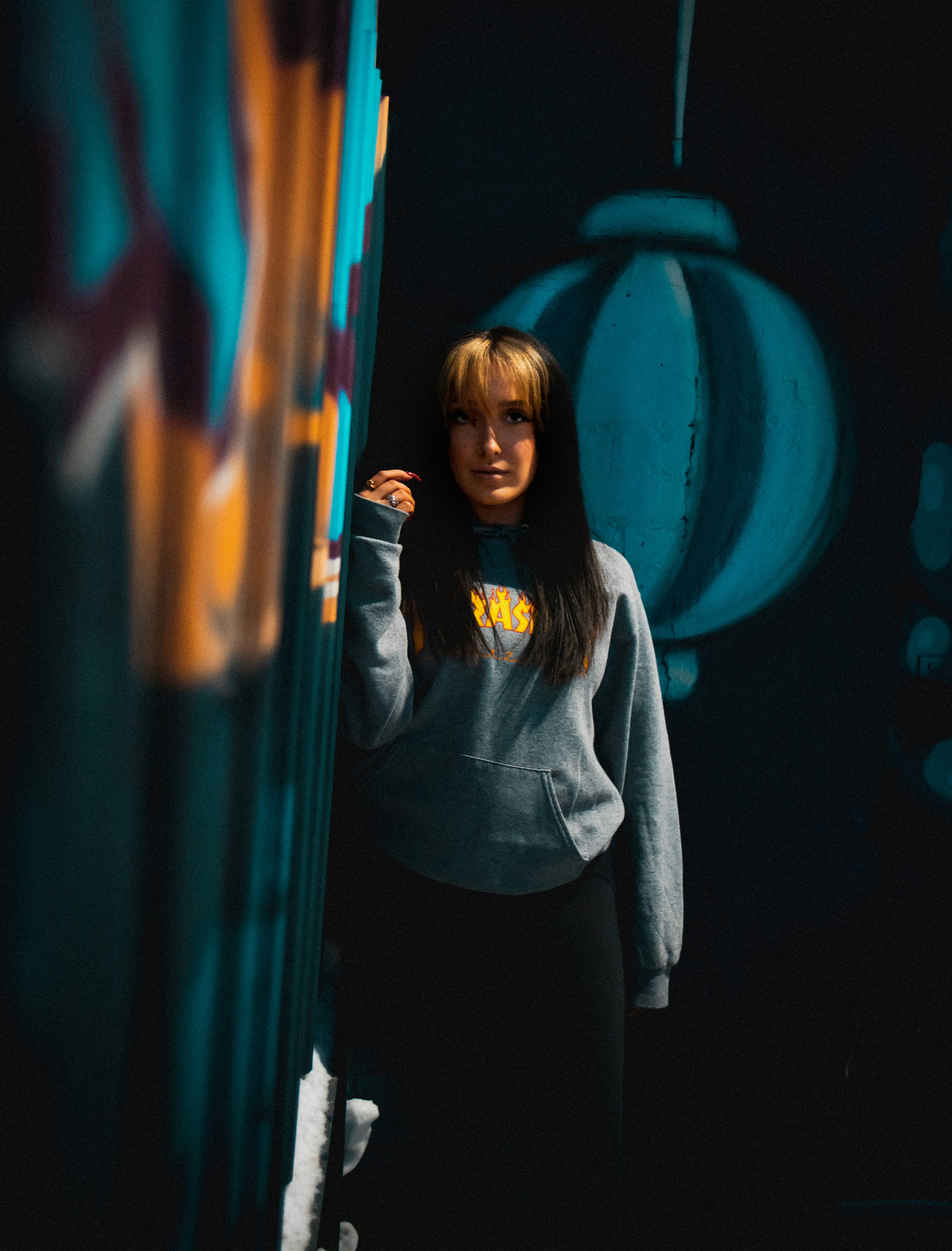 Neon Portrait in a Graffiti Corridor